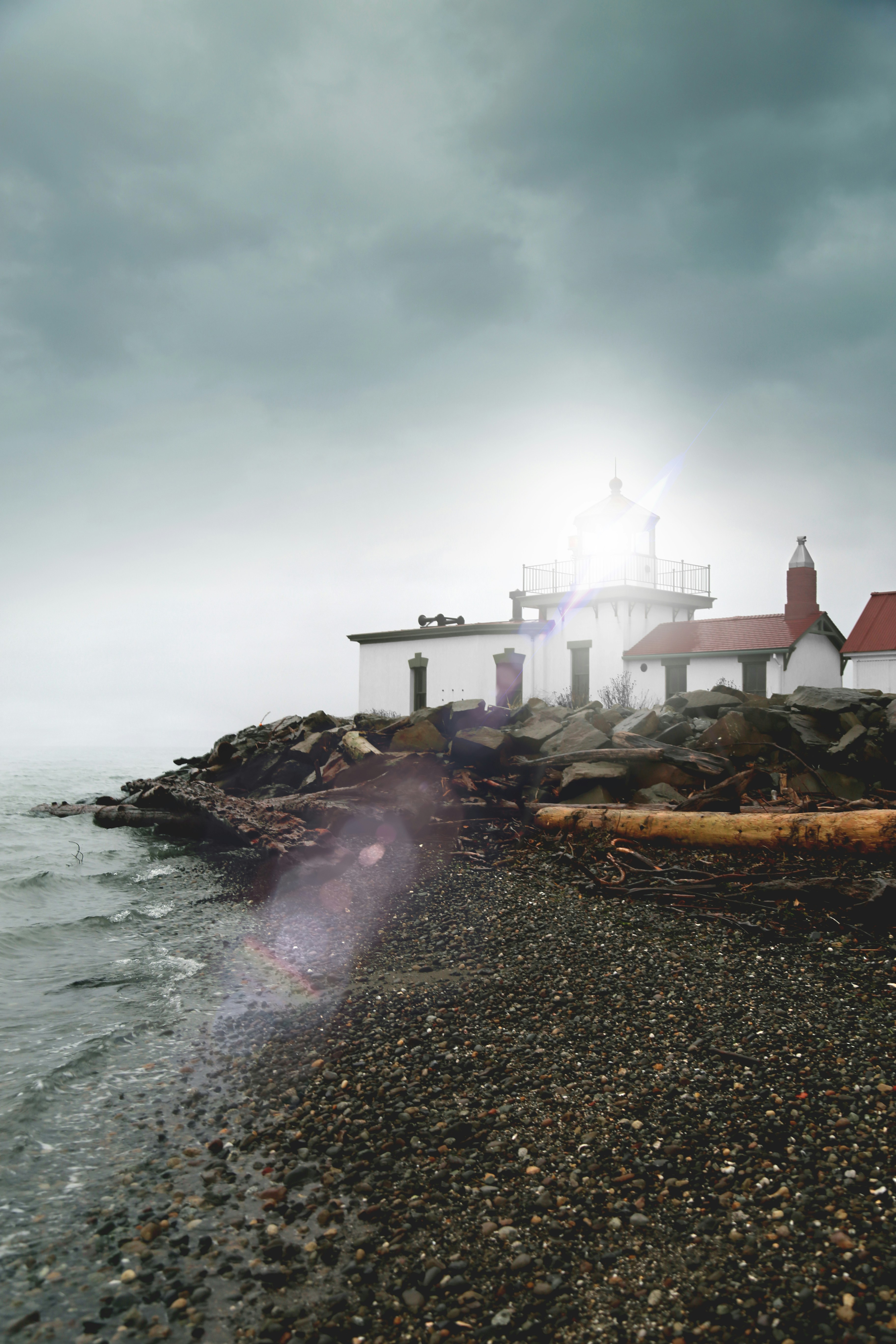 Sunflare, Stone and Light: Lighthouse Braving the Mist