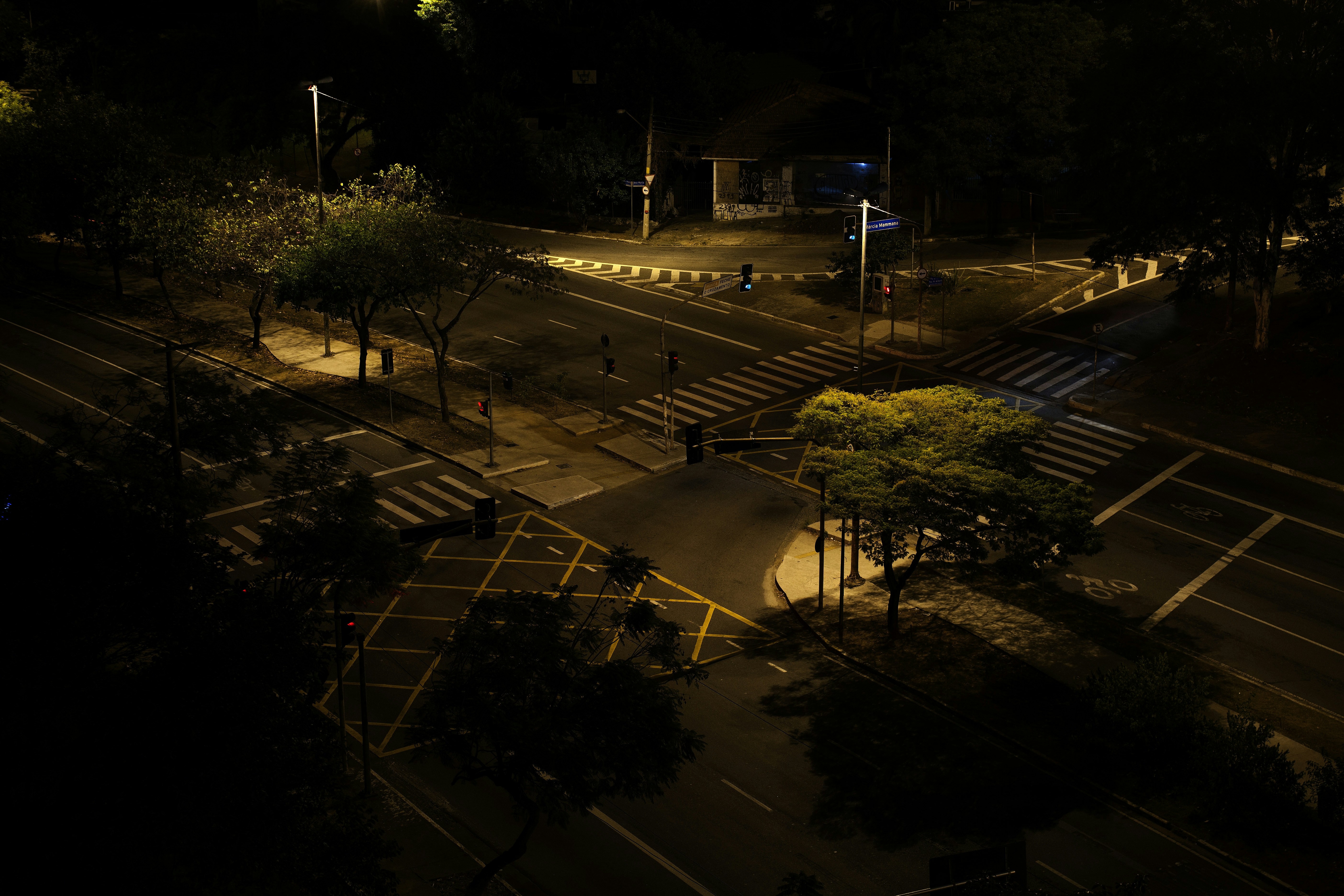 Midnight Crossroads: Geometry and Glow of an Empty City Intersection