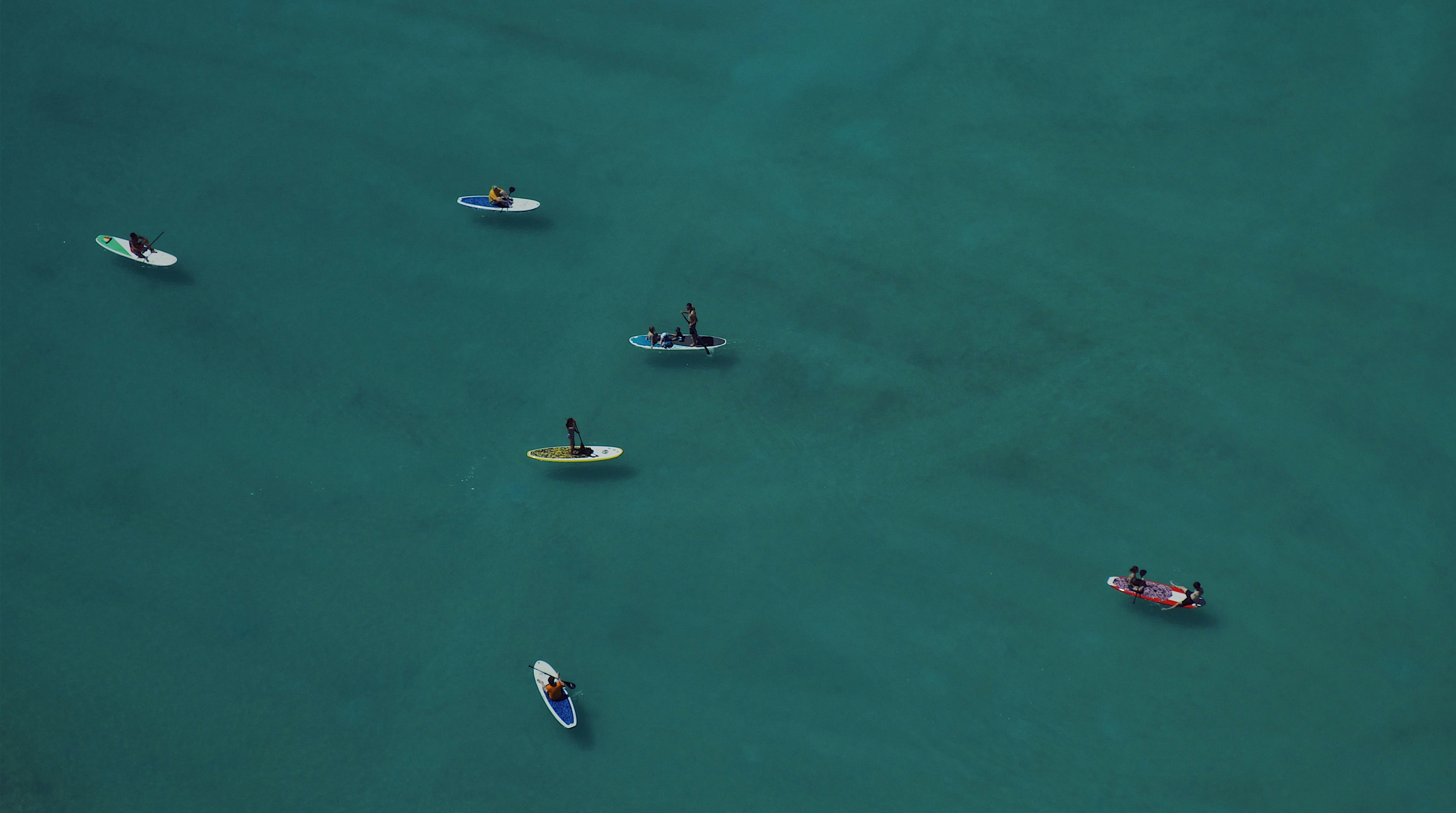 People riding boats photo – Free Grey Image on Unsplash