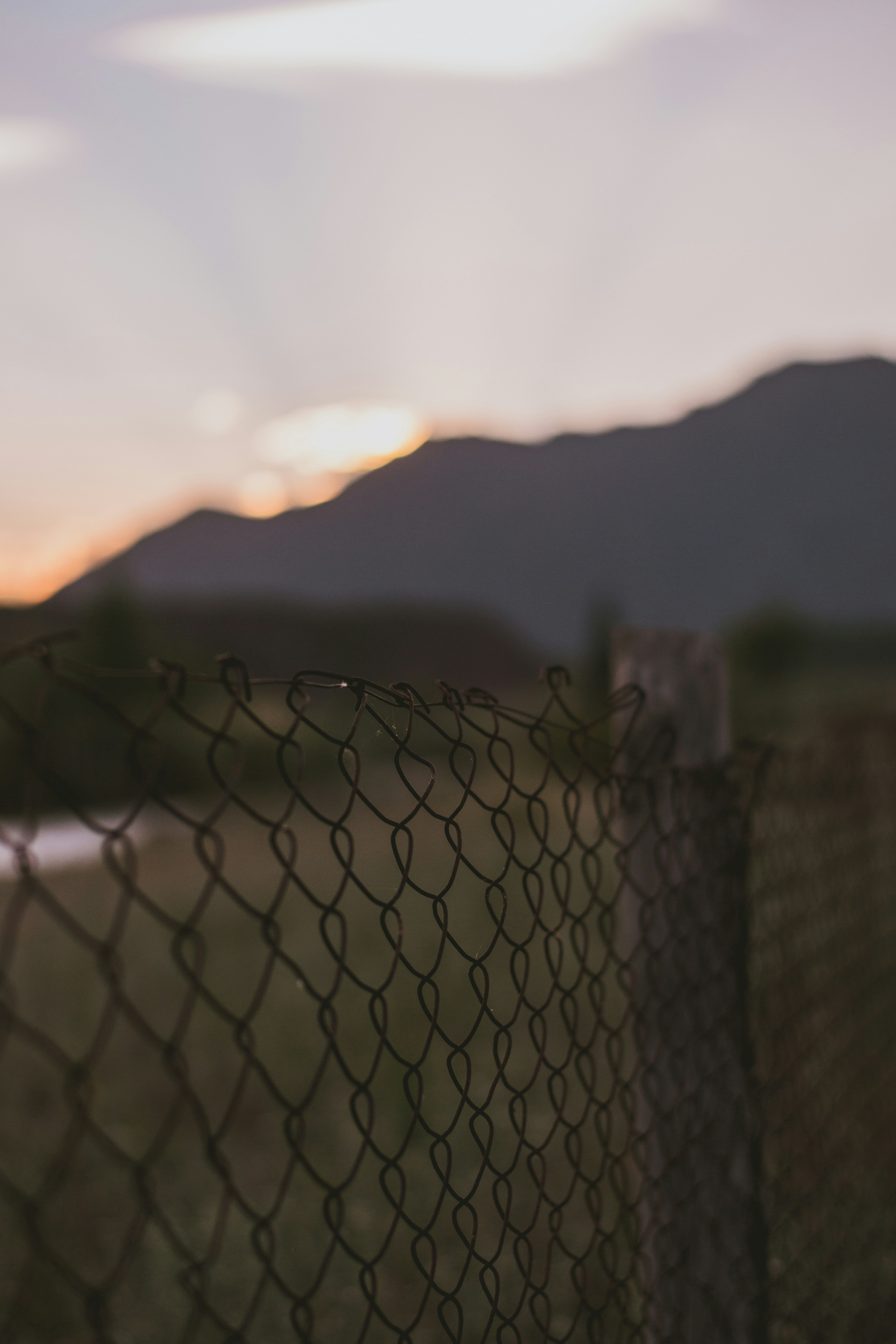 Selective focus photo of black chain link fence photo – Free Grey Image ...
