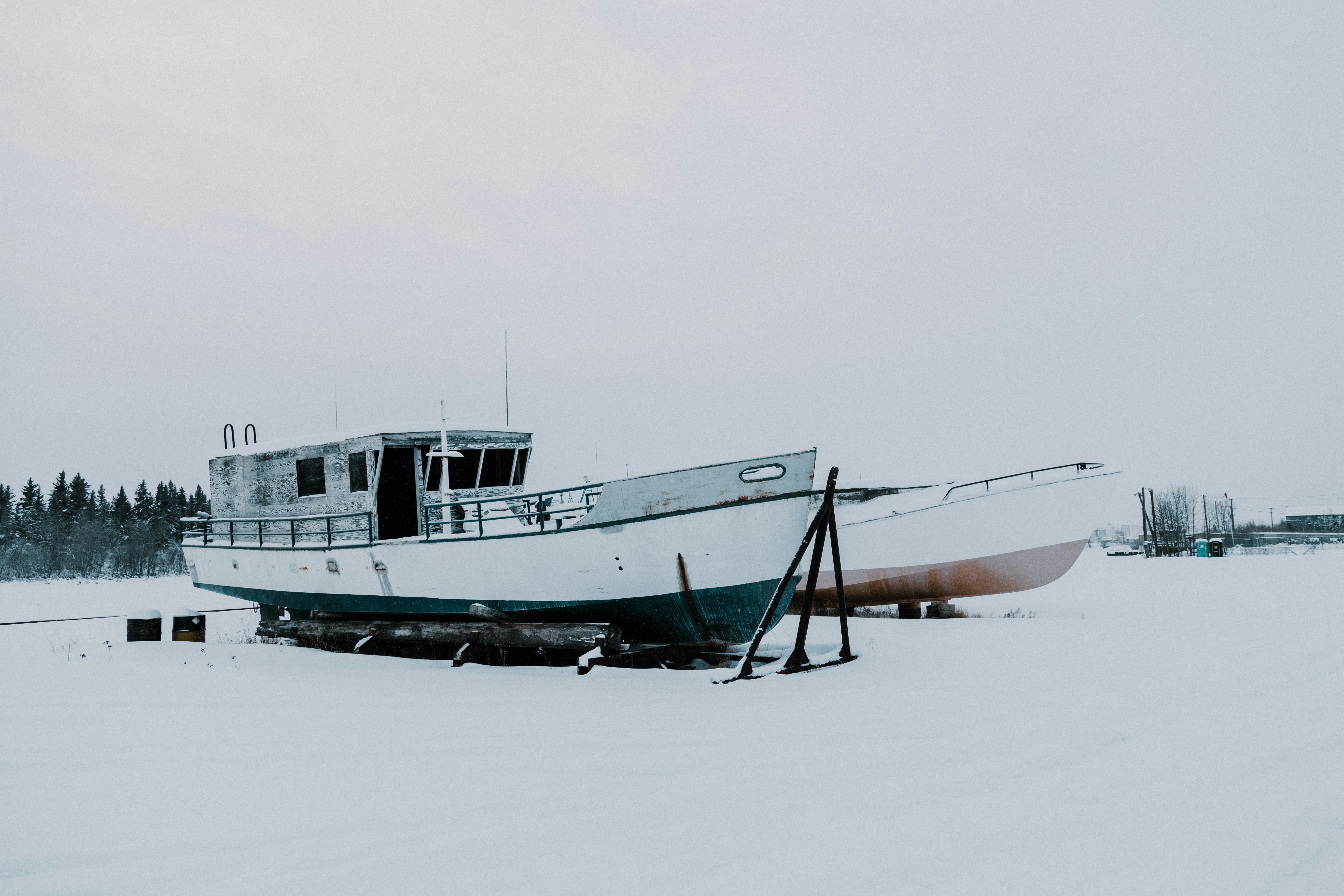 My family and I went on a road trip to Yellowknife, NWT and were exploring a small town in between. The ships had become a frozen wasteland in the icy cold (-38C). I’m sure they are quite floaty in the summertime!