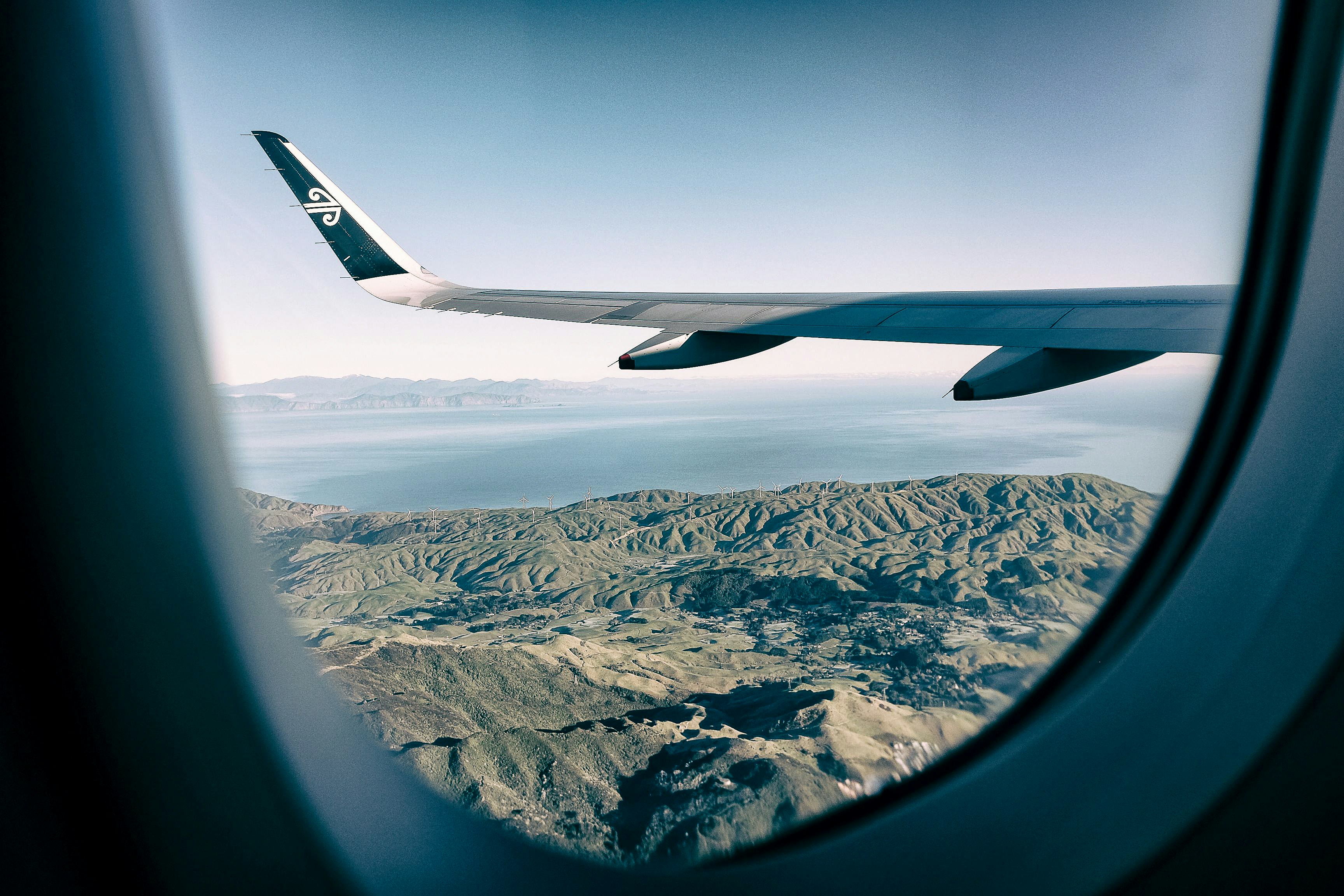 Morning in Wellington | plane wings outside plane window