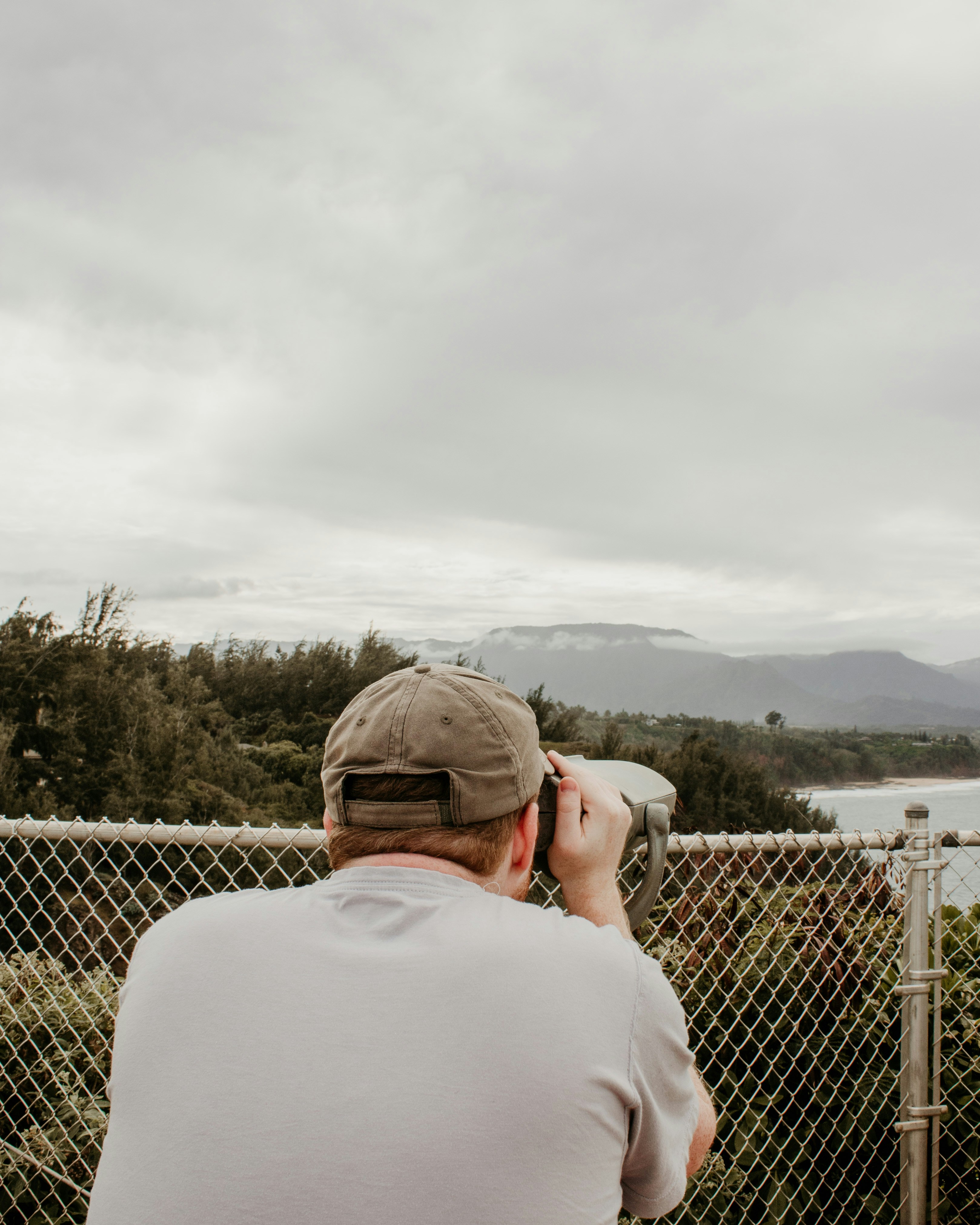 Horizon Watcher at the Fence: Framing distant hills and sea