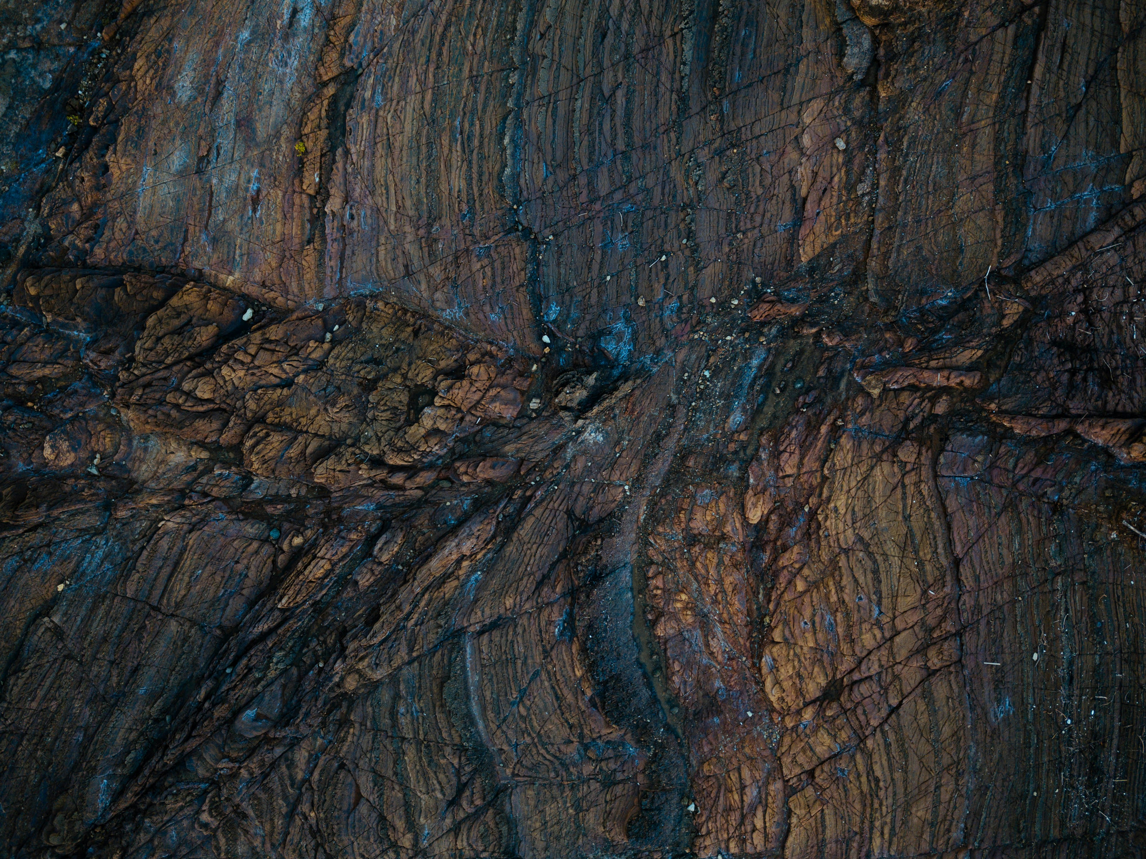 Intricate patterns of rock layers showcasing the geological history of the earth's crust.