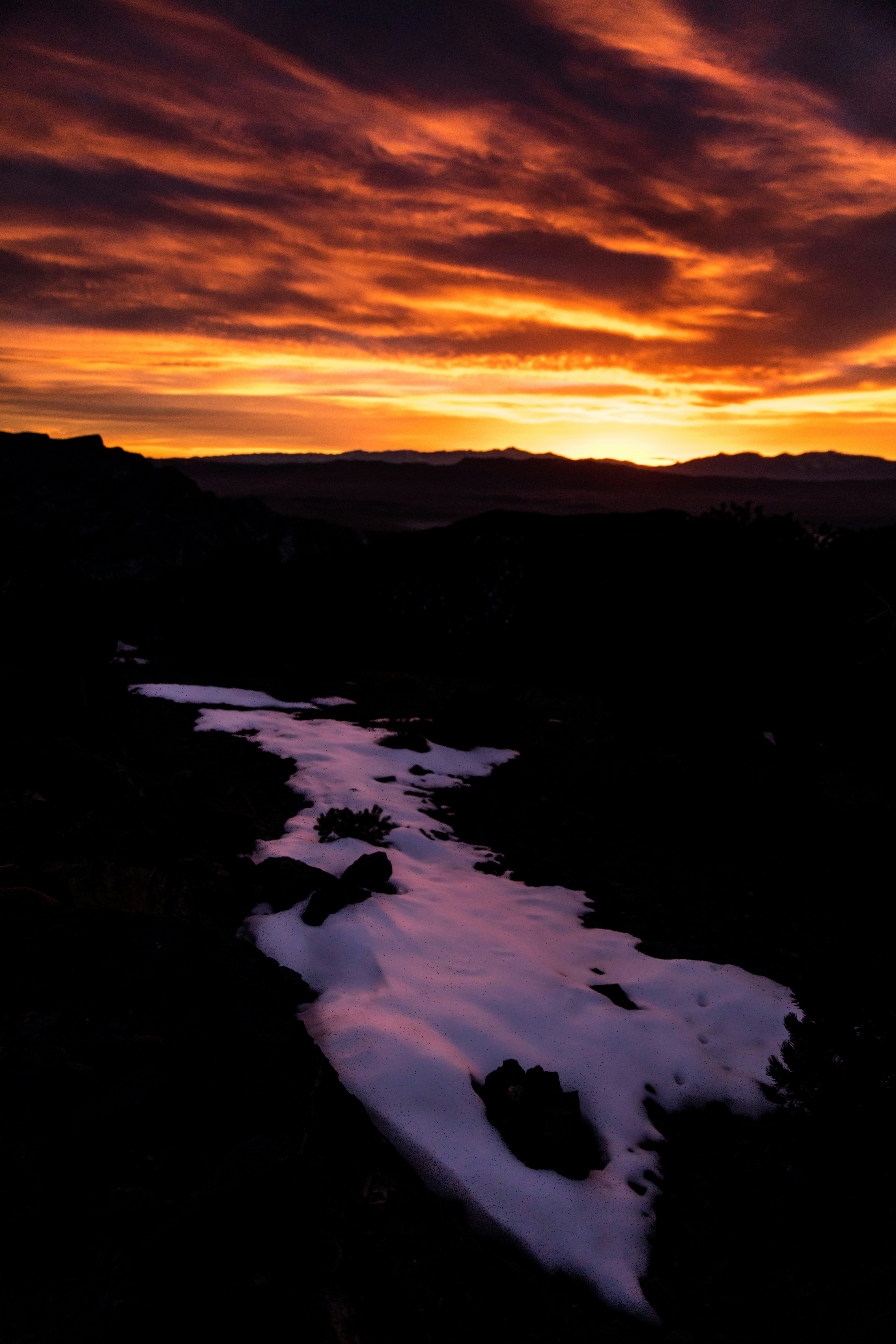 Ember Rim: A Lava-Black Horizon Embraced by Dusk