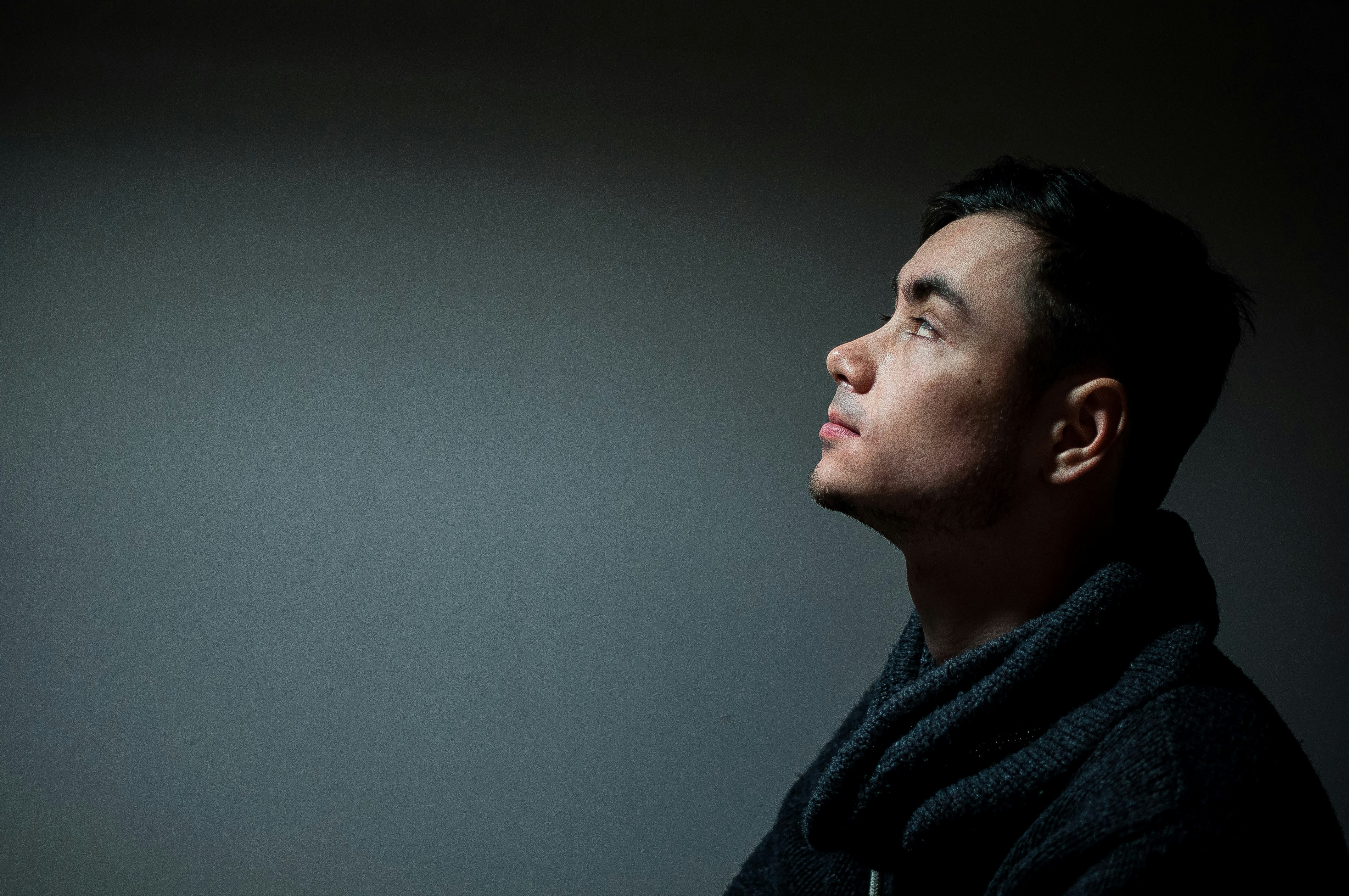 old man | close-up photography of man wearing black top