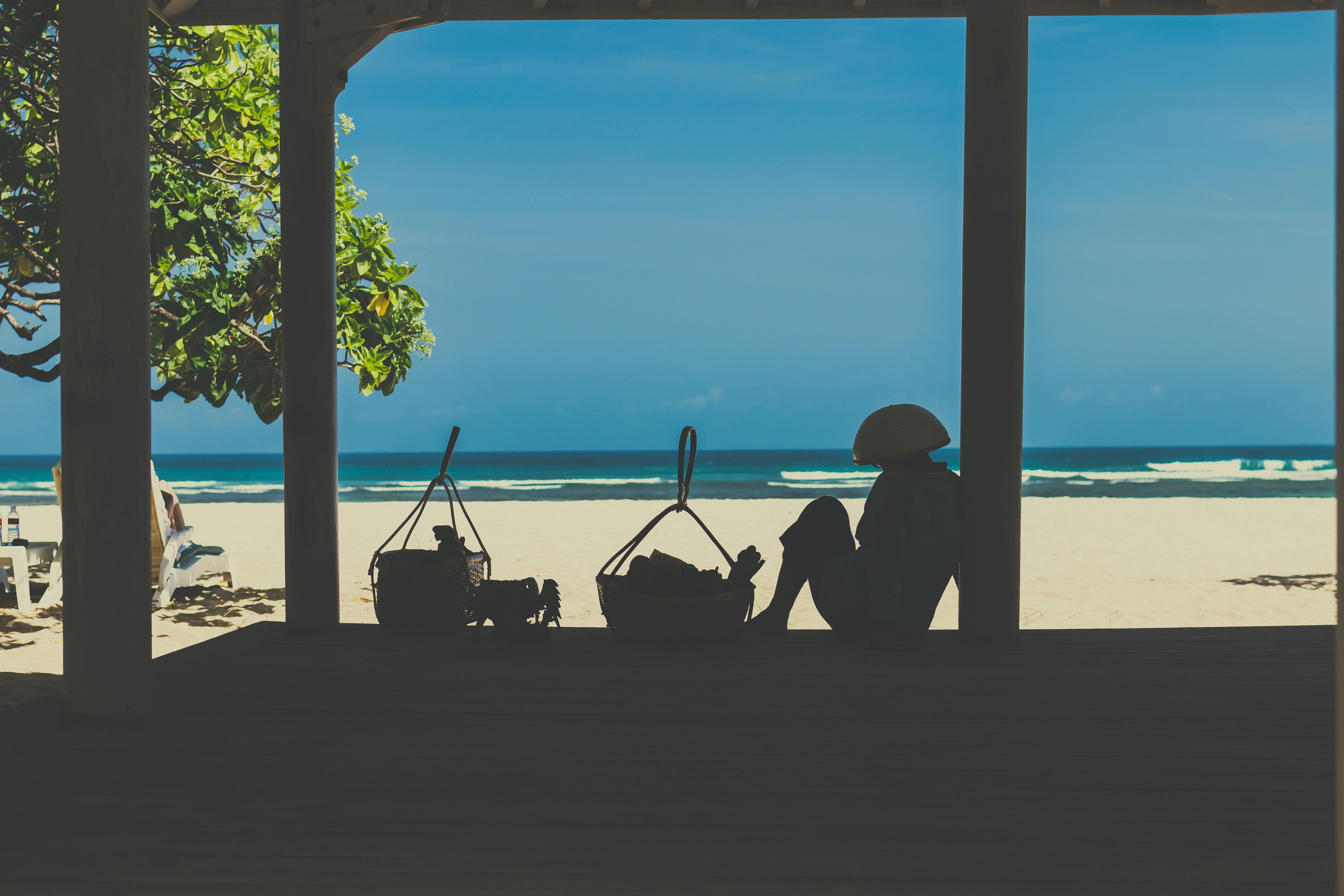 Tropical beach, Bali island. Silhouette of a man.
