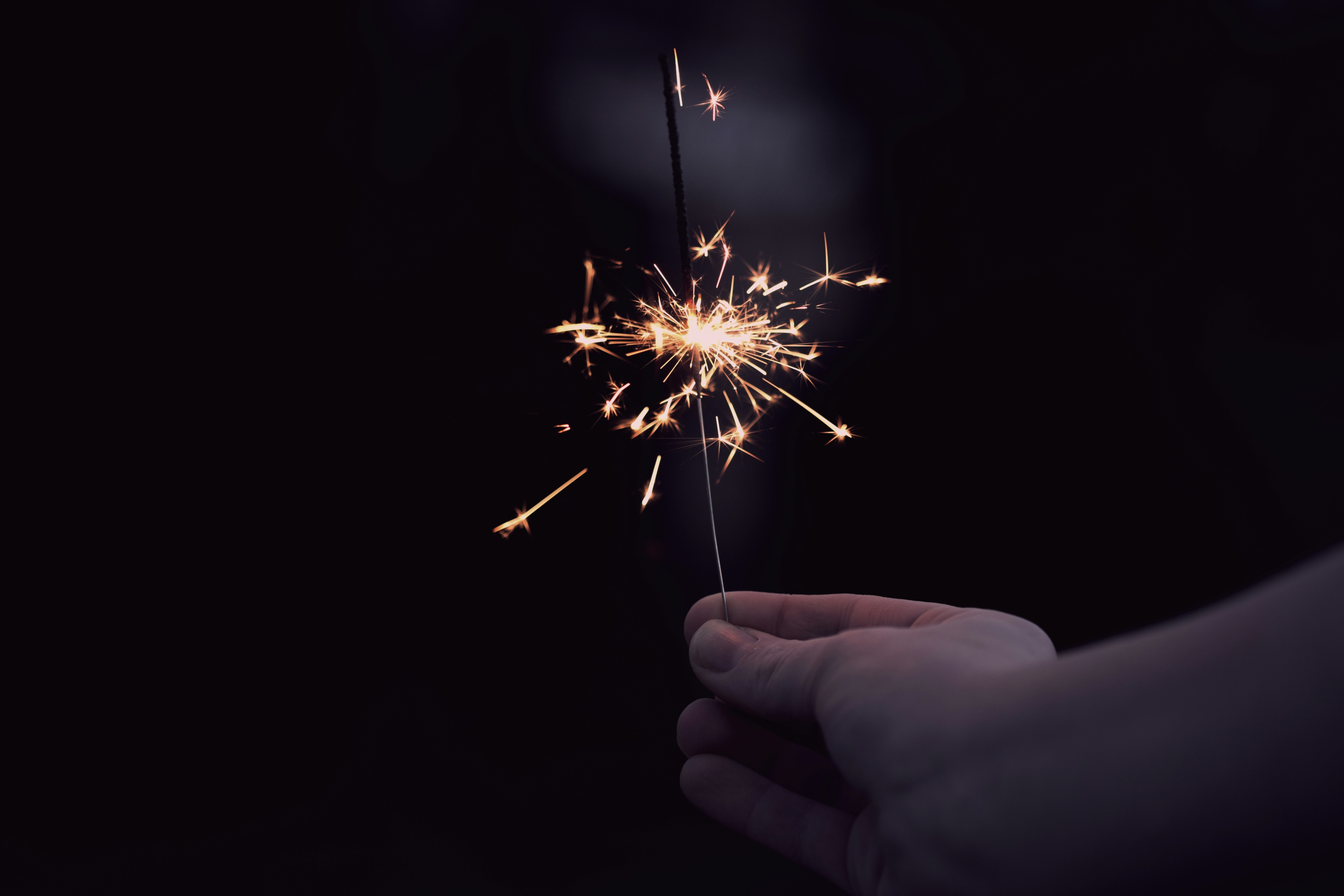 I had some sparklers leftover from a birthday party, so I put one to good use this morning before the sun came above the horizon. | person holding a sparkler