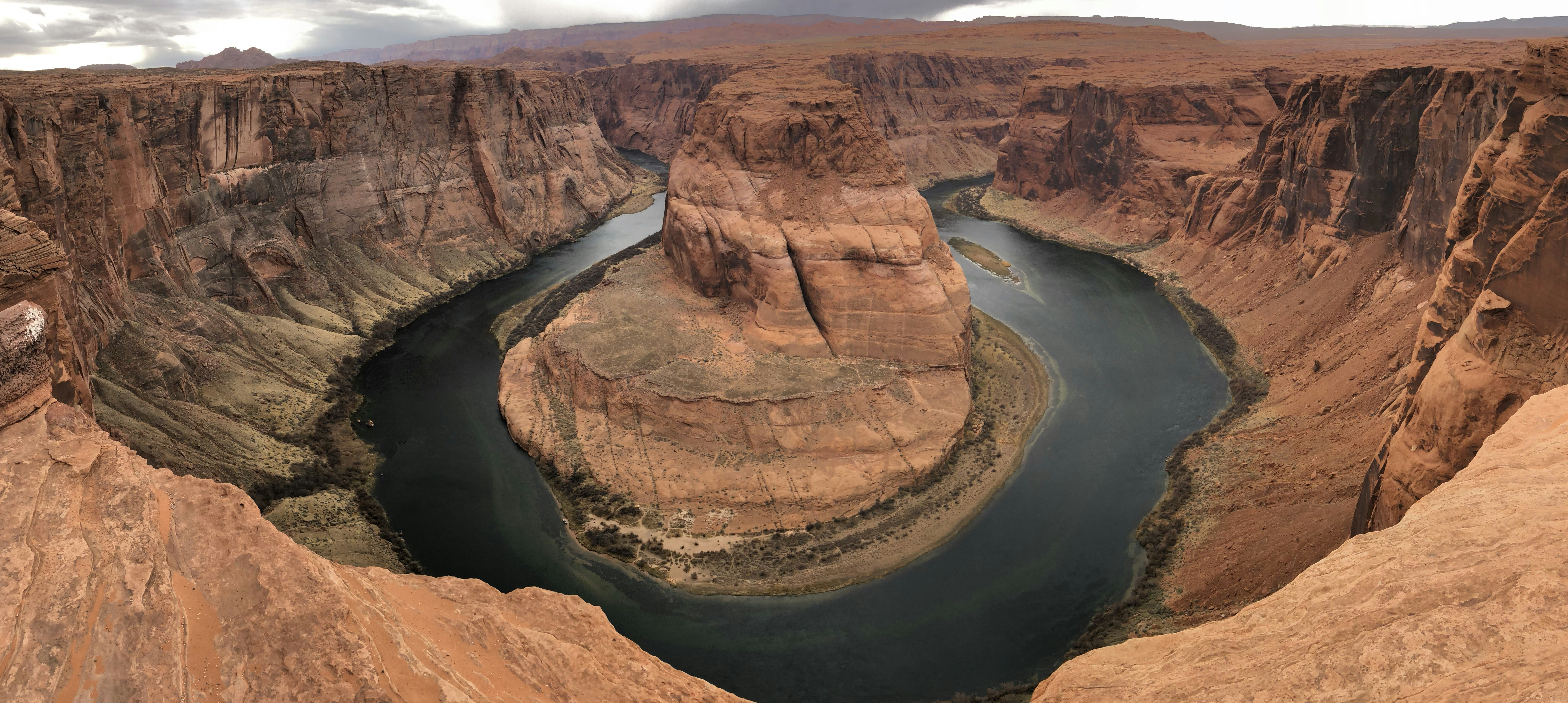 Horseshoe Bend: Crimson Canyon's Central Rock Embrace