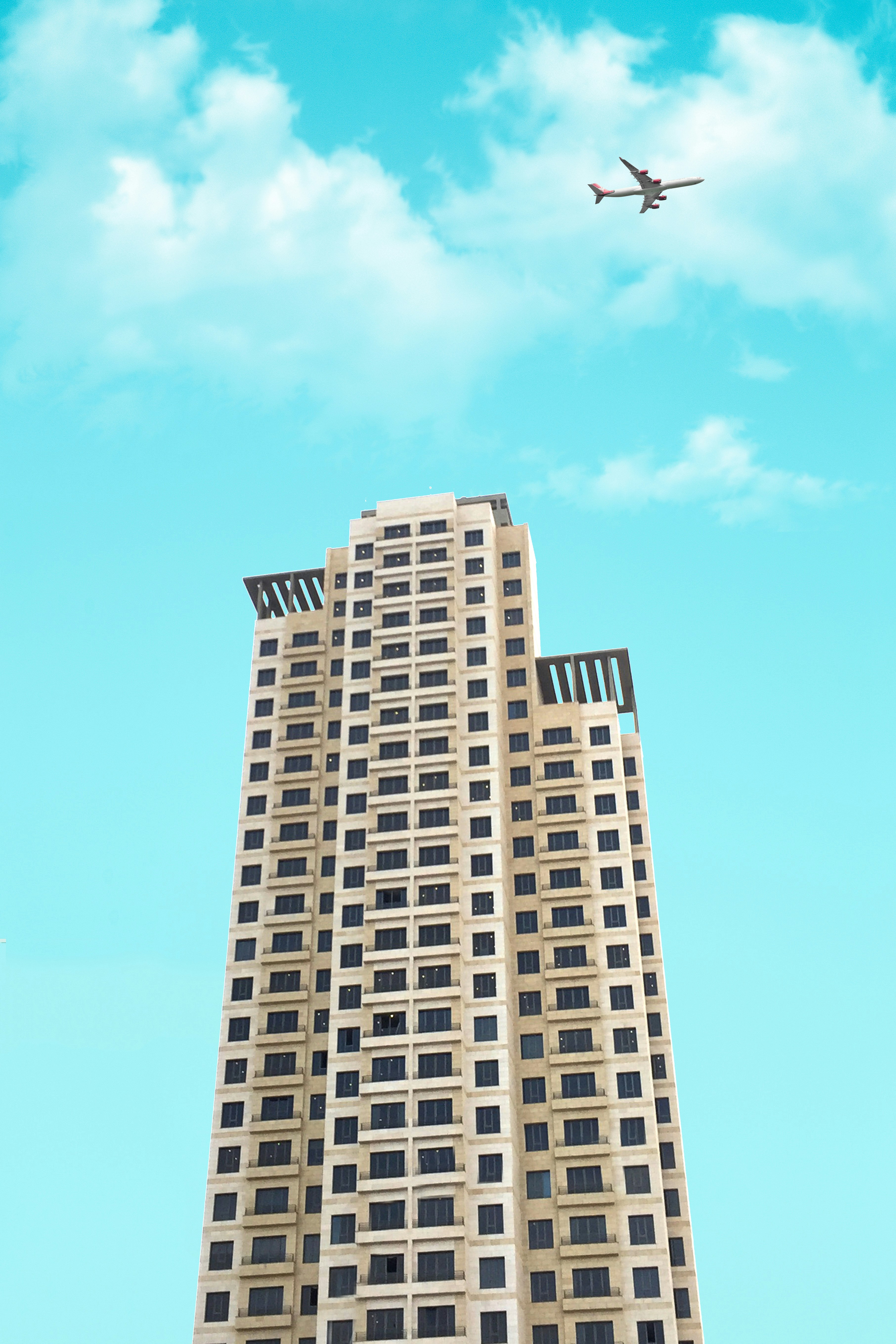 Photo of white high-rise building under blue and white sky photo – Free ...