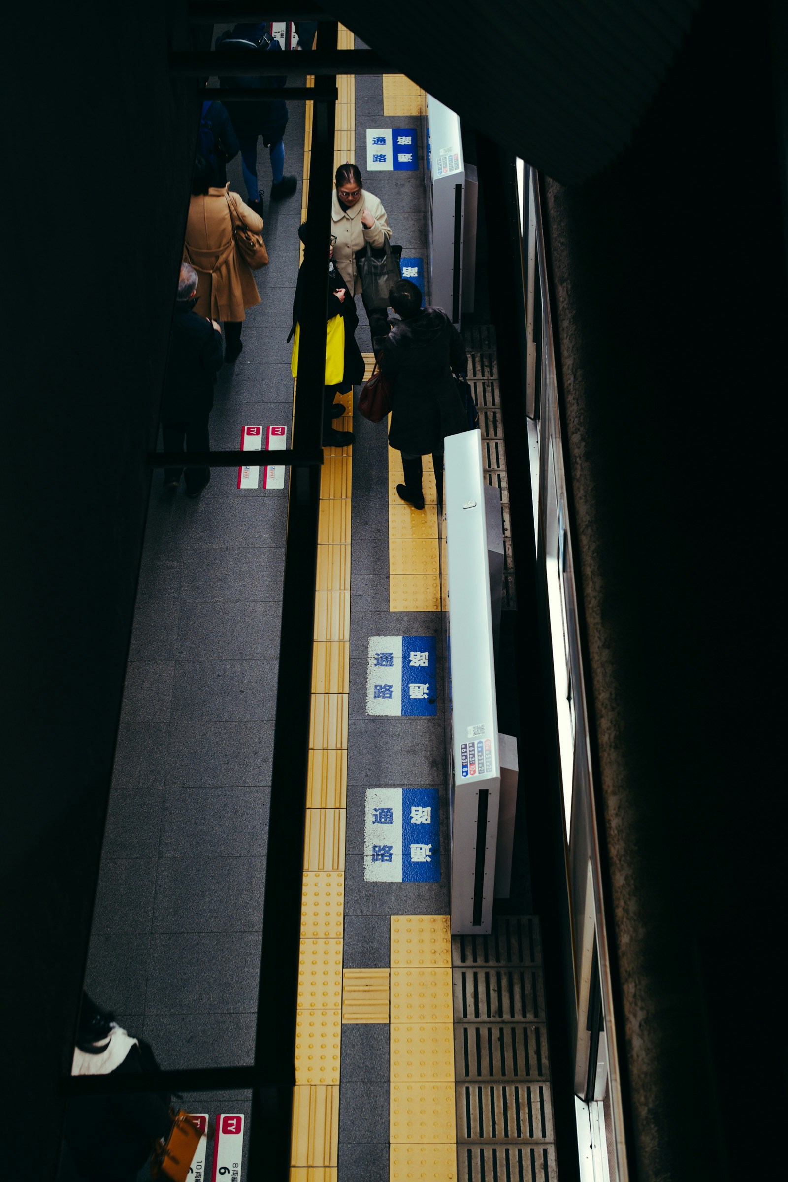 Platform | people passing on the sidewalk
