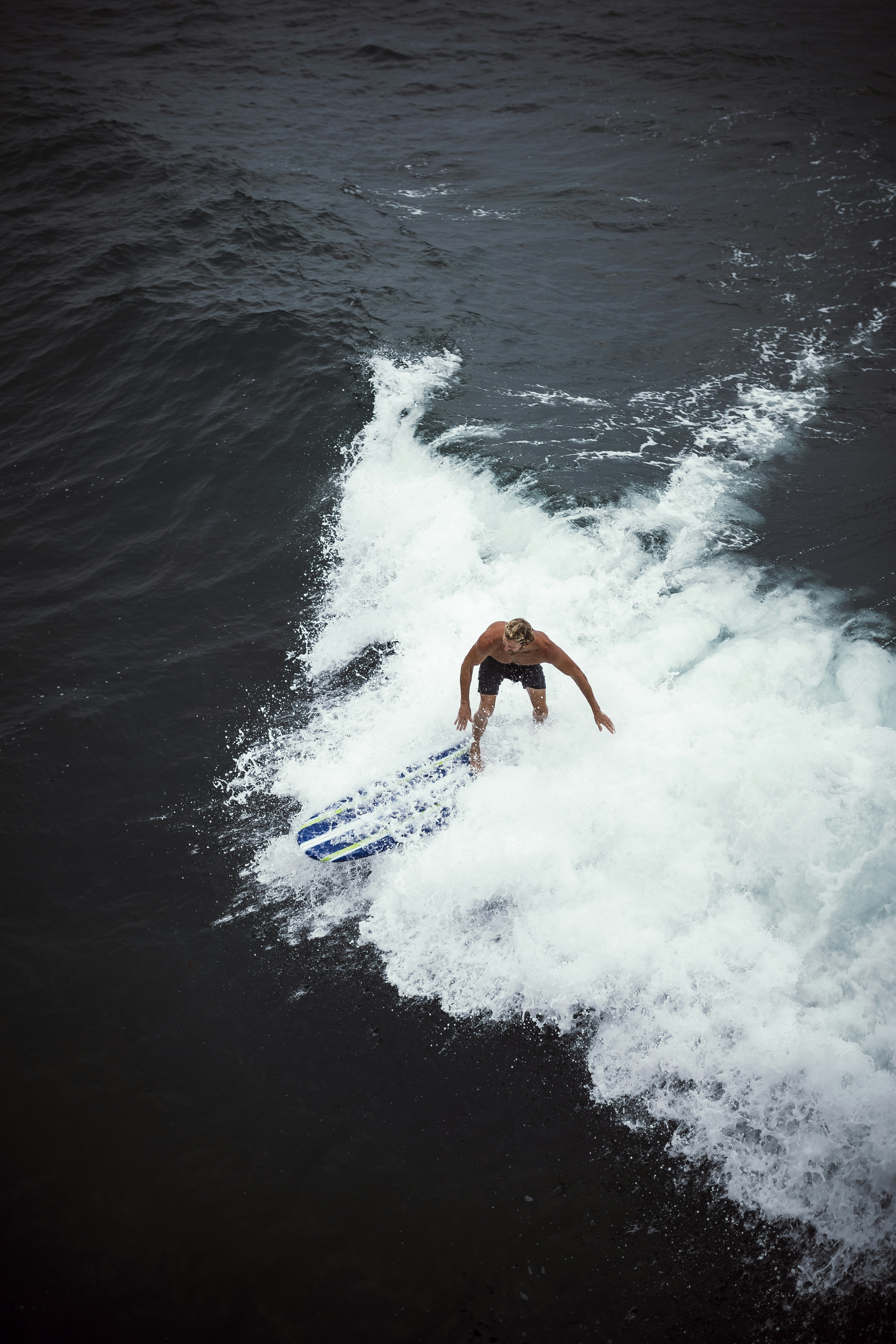 Person surfboarding on waves photo – Free San diego Image on Unsplash