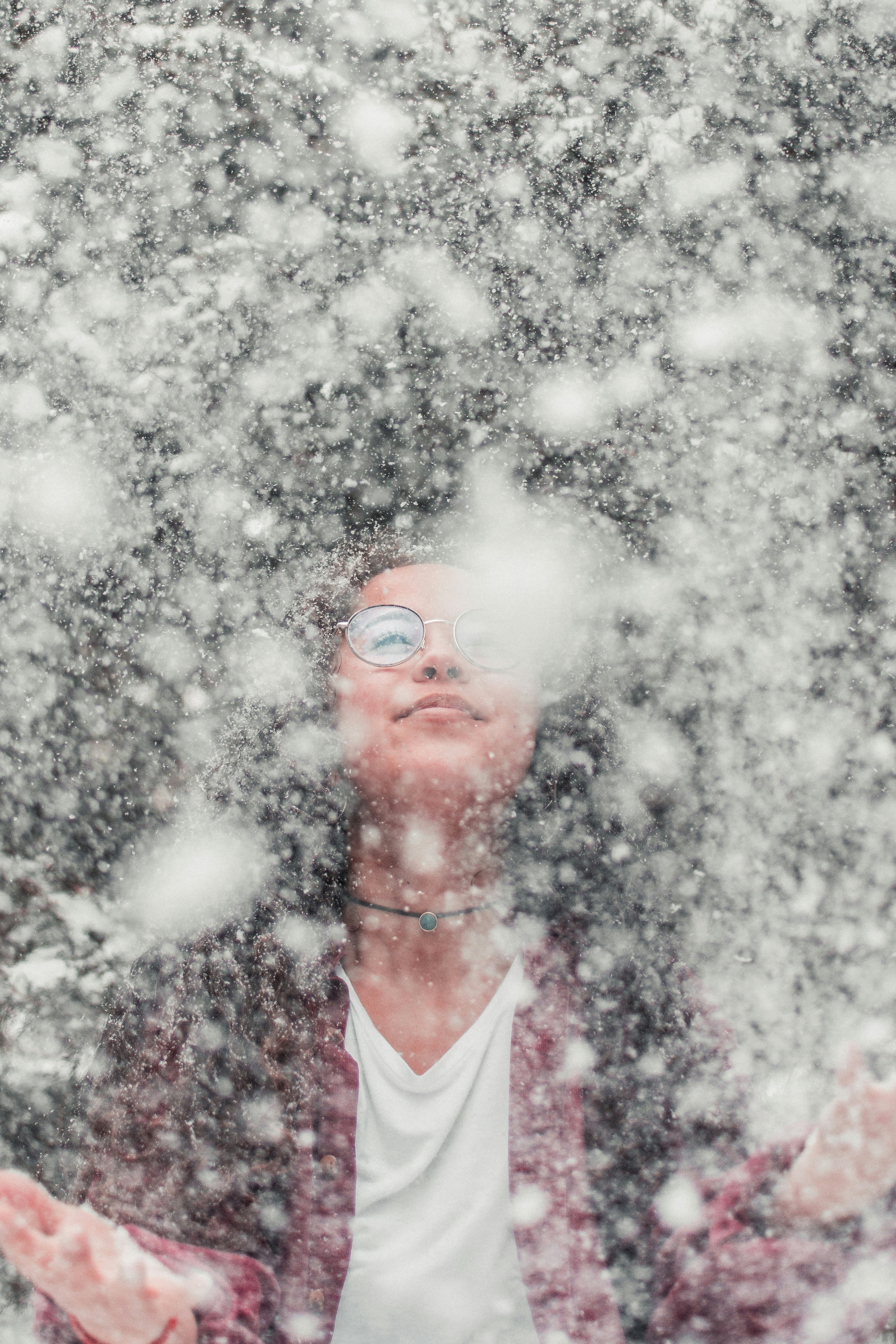 Woman trying to catch the falling snows photo – Free Lincoln Image on ...