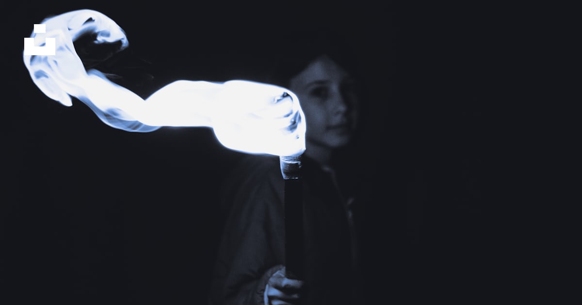 Grayscale Photo Of Person Holding Torch Photo Free Libya Image On