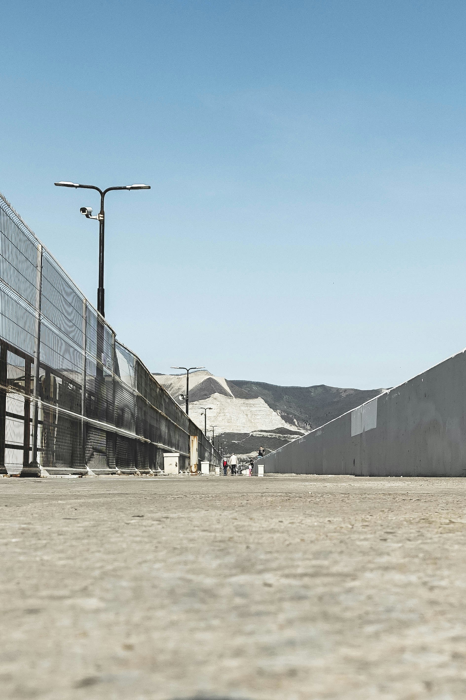 People walking on pathway with mountain background photo – Free Oepn ...