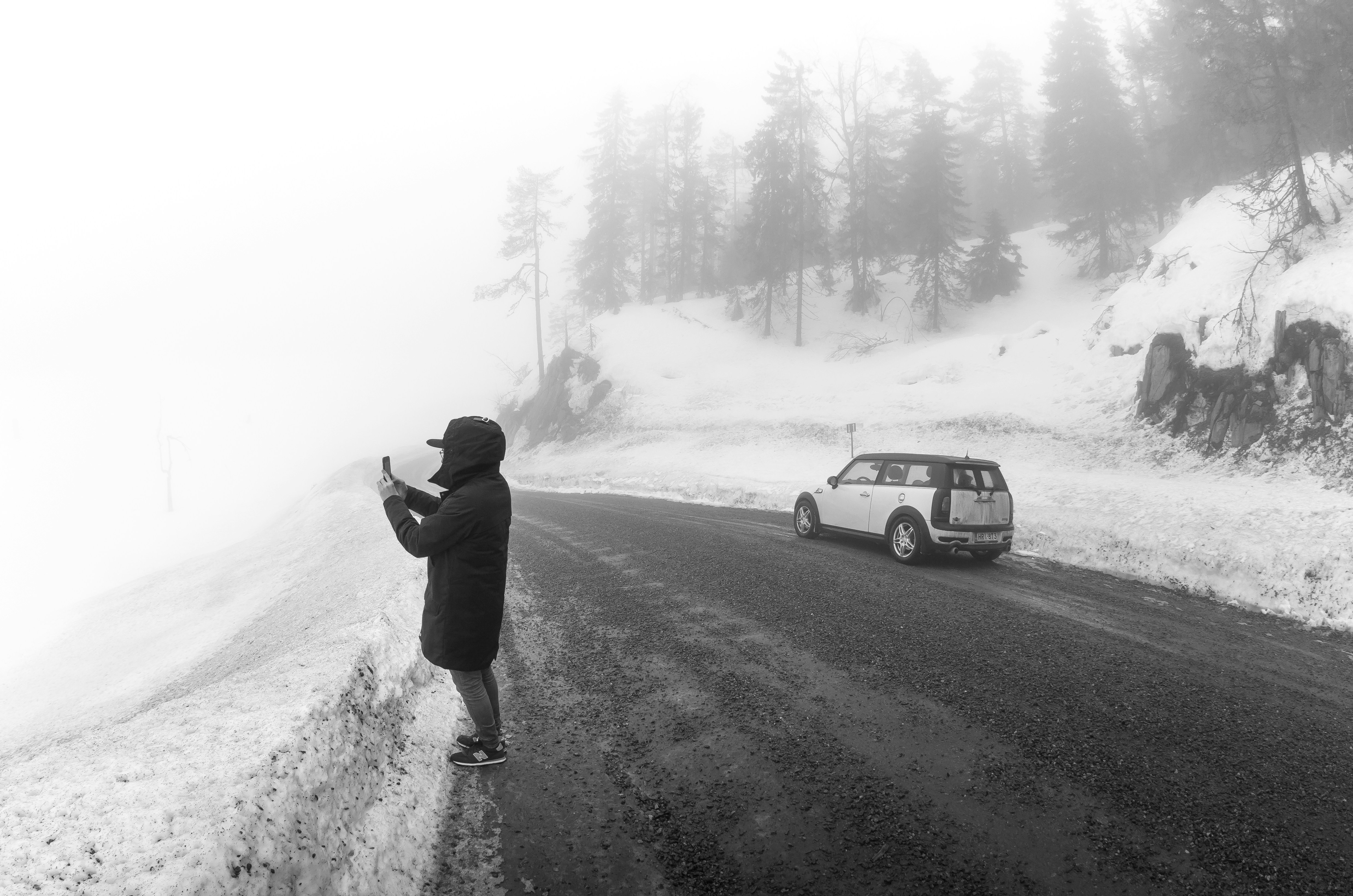 Framing the fog on a snowbound alpine road