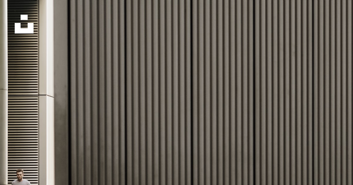 Man walking towards gray wall photo – Free Texture Image on Unsplash Man walking towards gray wall photo – Free Texture Image on Unsplash