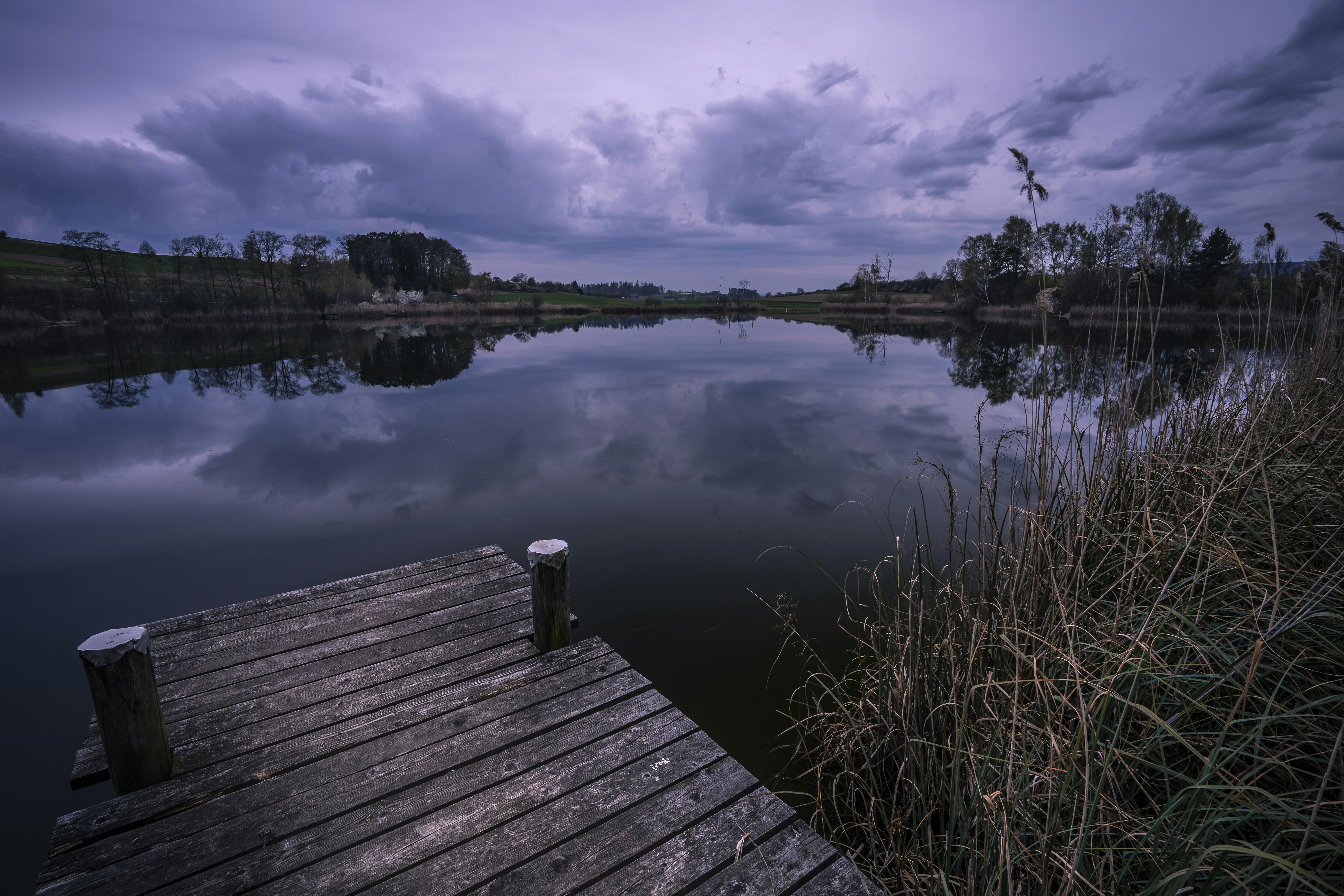 Twilight Reflections on a Quiet Dock