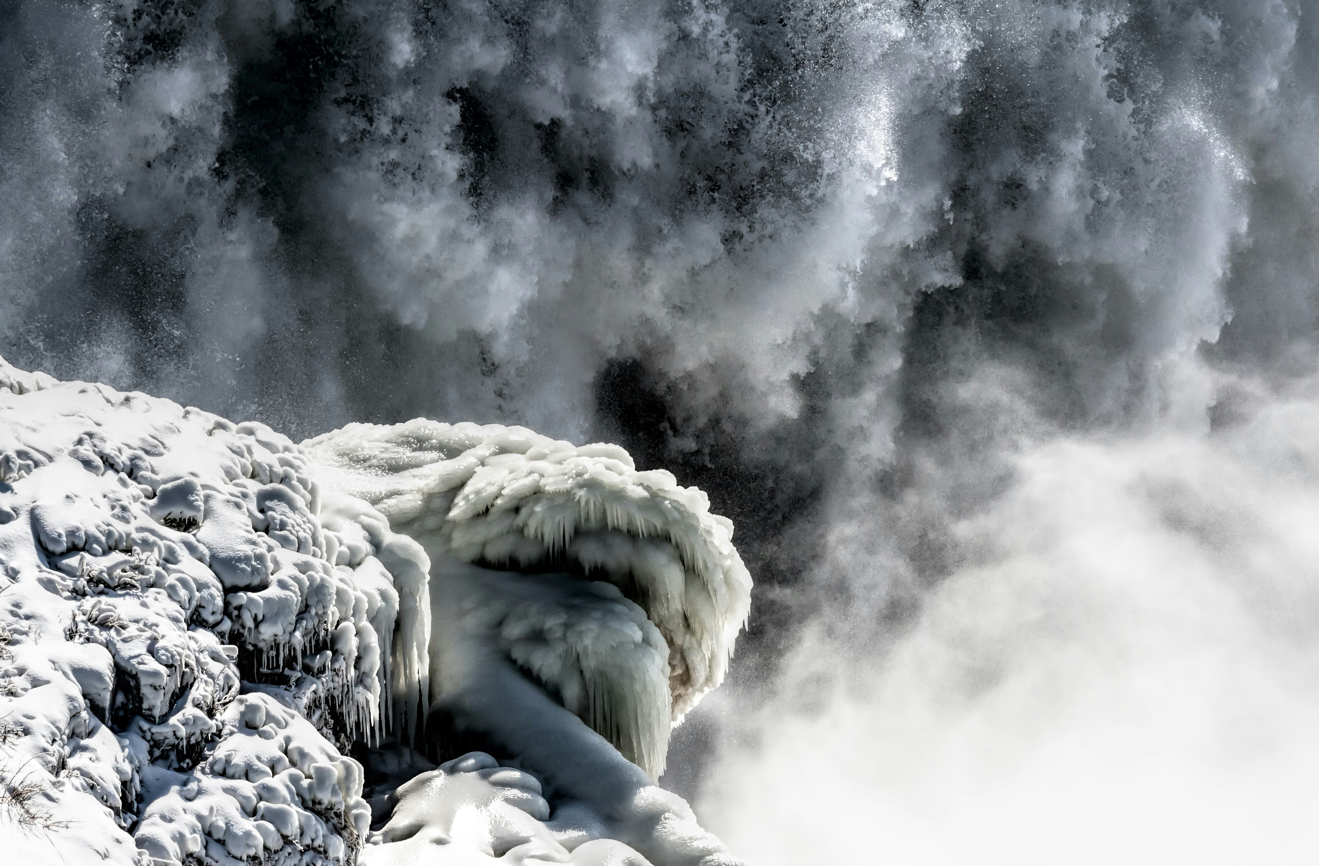 Ice-Crowned Rock Breathing Steam