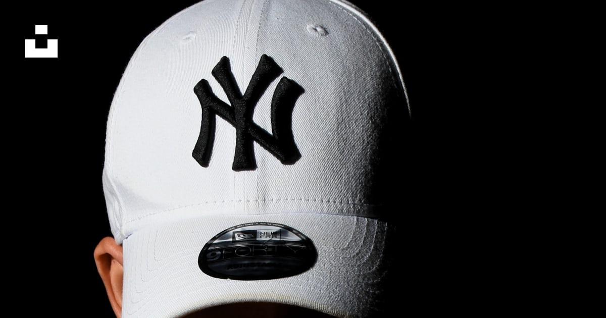 Man Wearing New York Yankees Cap Photo Free Person Image On Unsplash