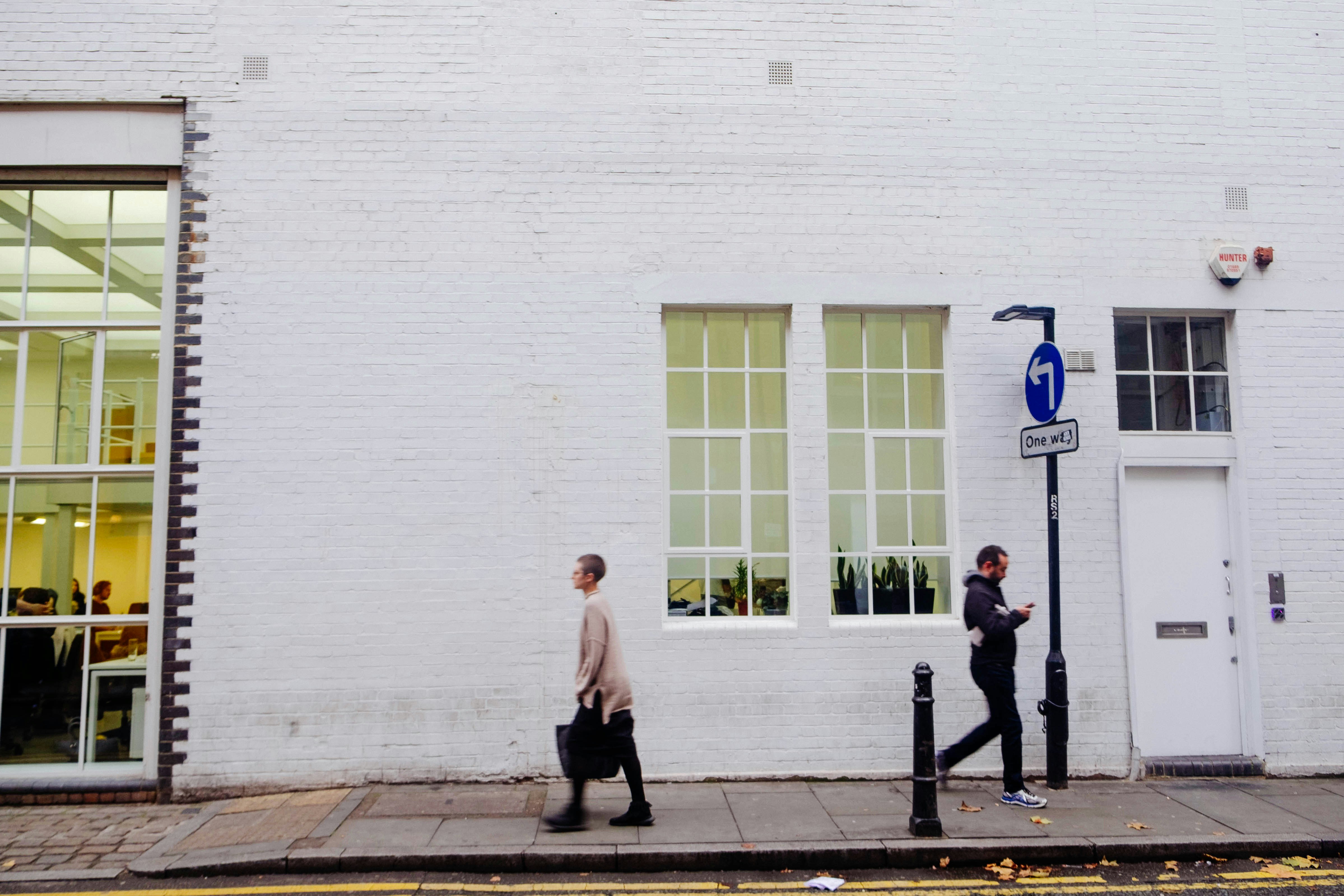 Two person walking on side walk photo – Free London Image on Unsplash