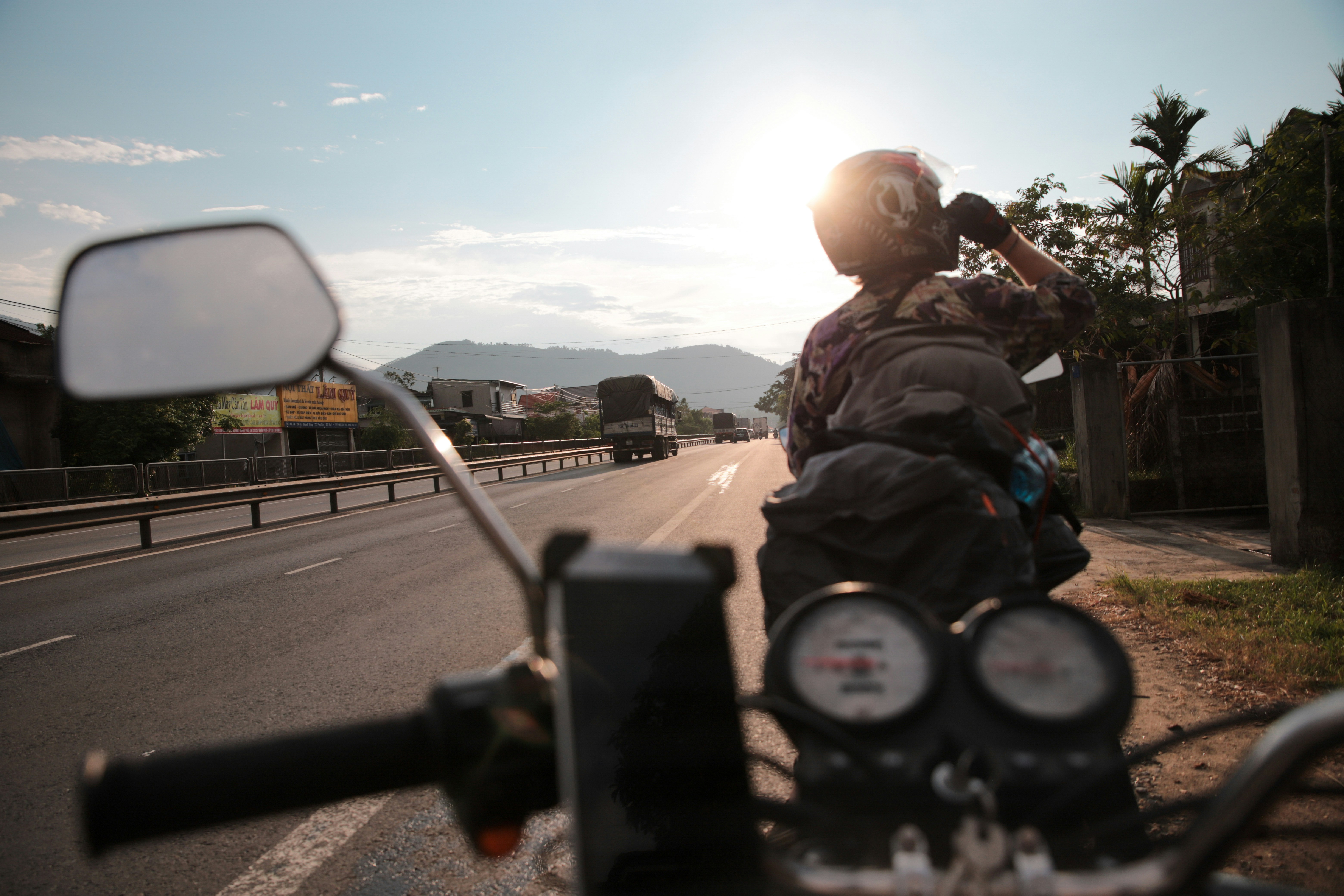 Man driving motorcycle on road photo – Free Road Image on Unsplash
