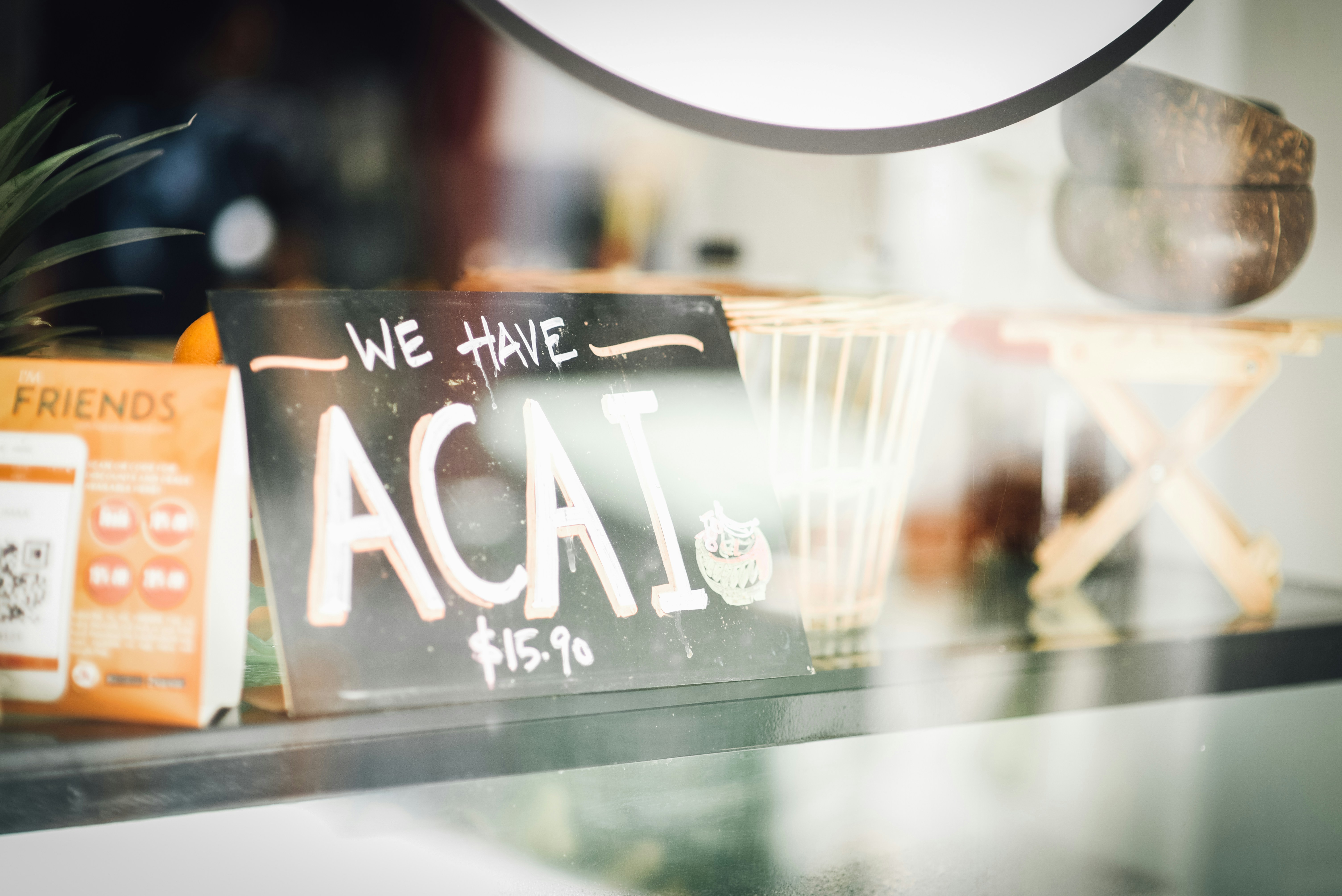 We Have Acai frame on black wooden plank photo – Free Singapore Image ...