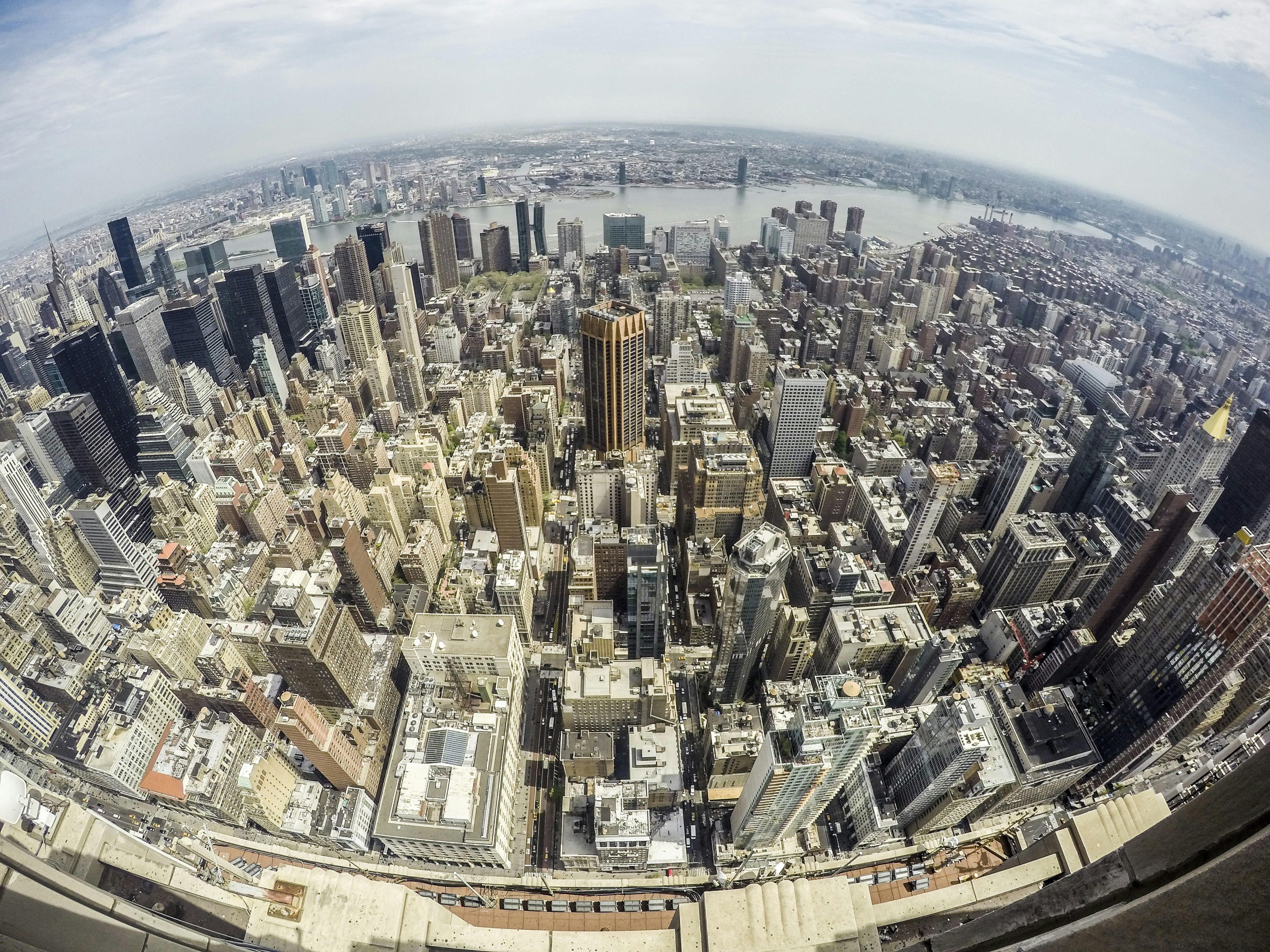 Edge of the Empire: Fisheye Flyover of Manhattan's Dense Skyline