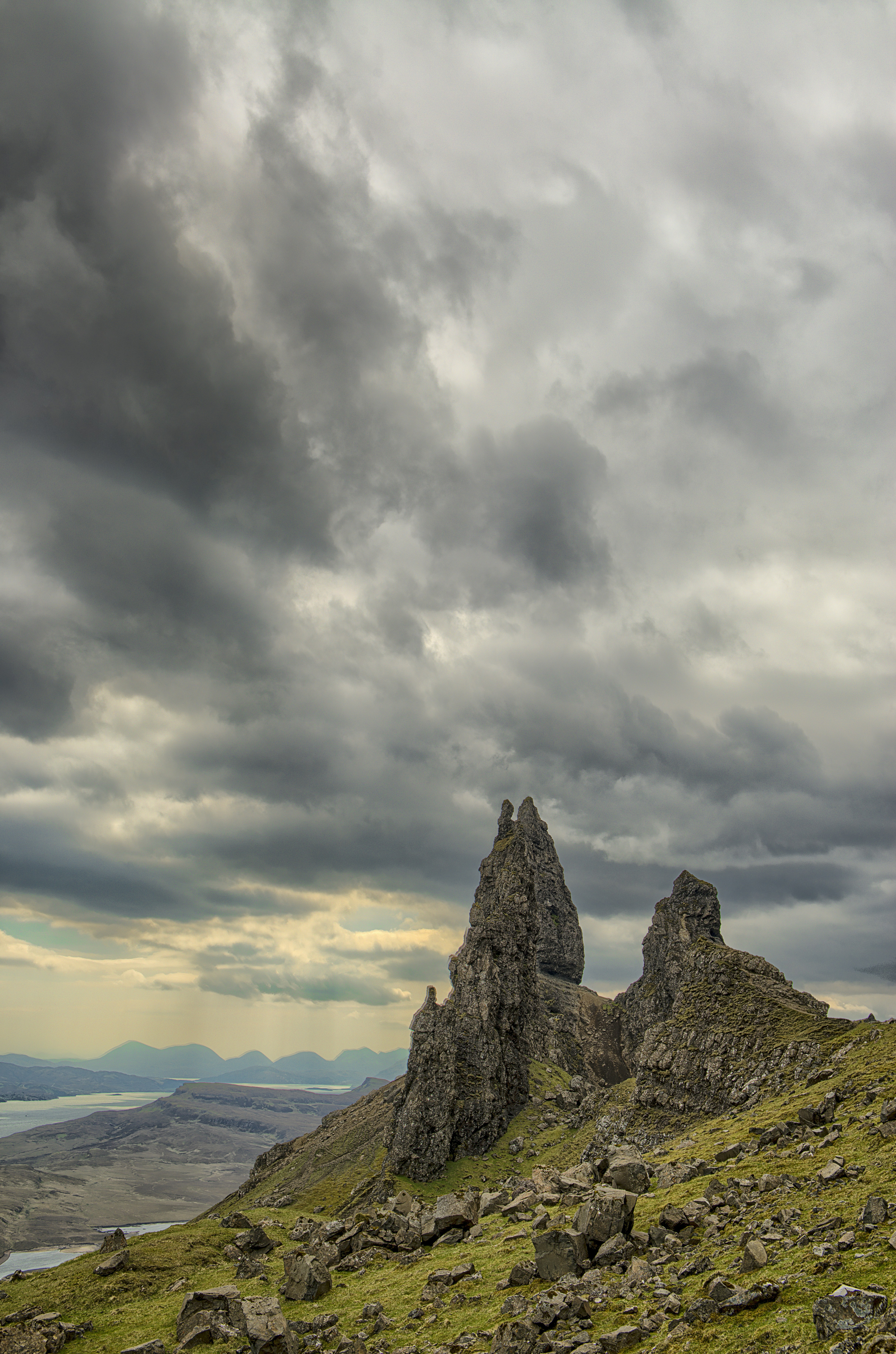 Landscape photography of green and grey rocky hill under cloudy sky ...