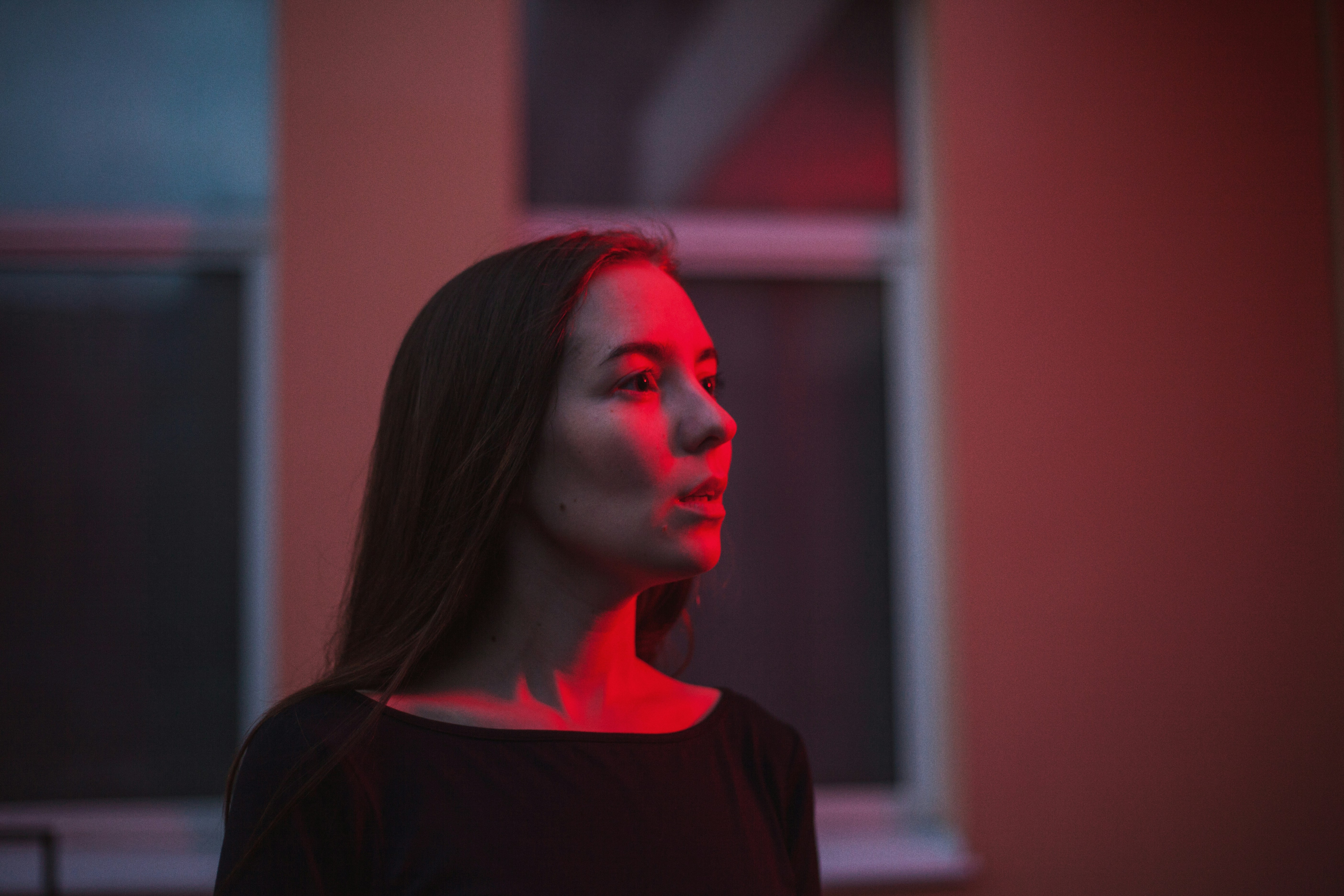 Crimson Gaze Under Neon Light