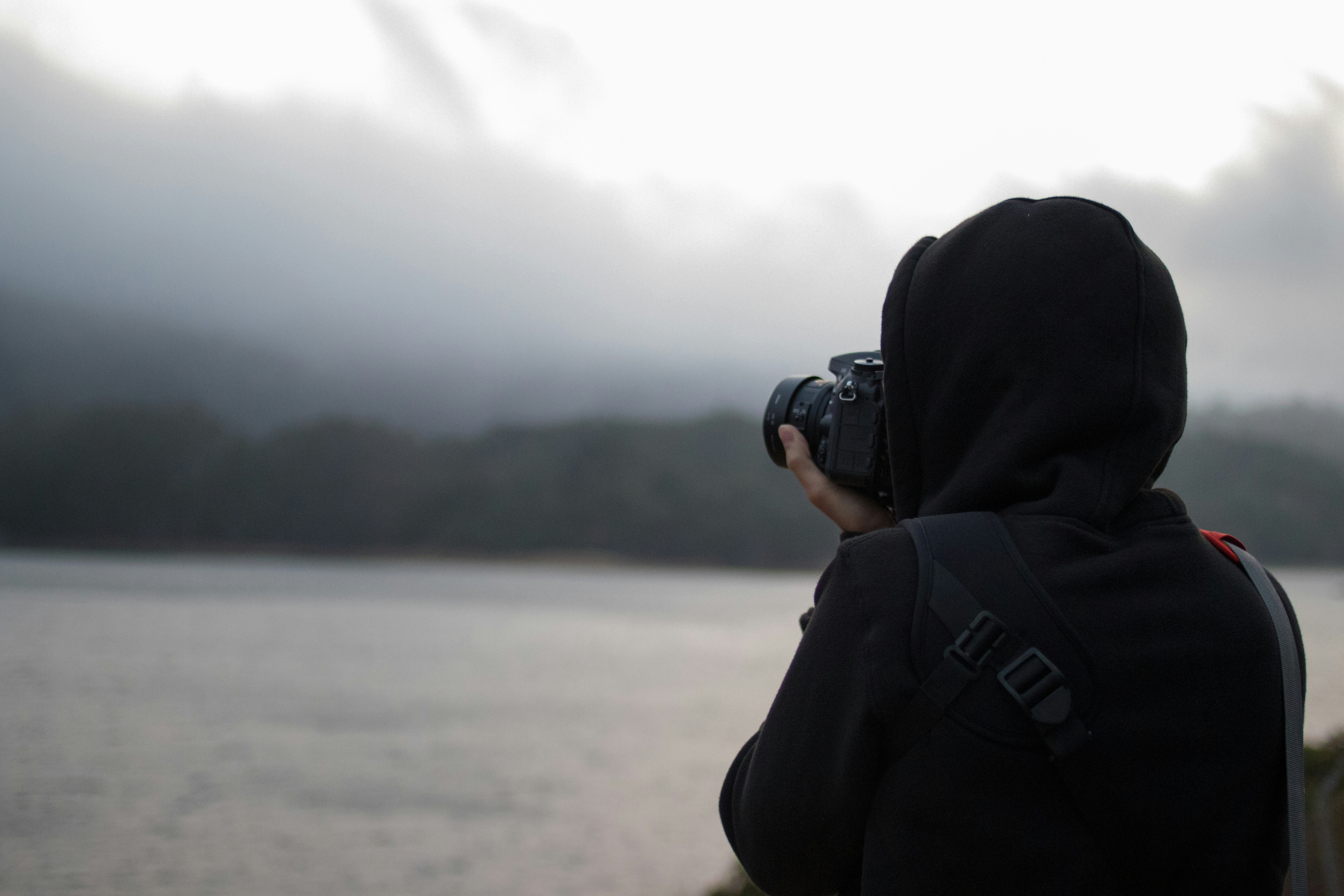 Person using DSLR camera photo – Free Person Image on Unsplash