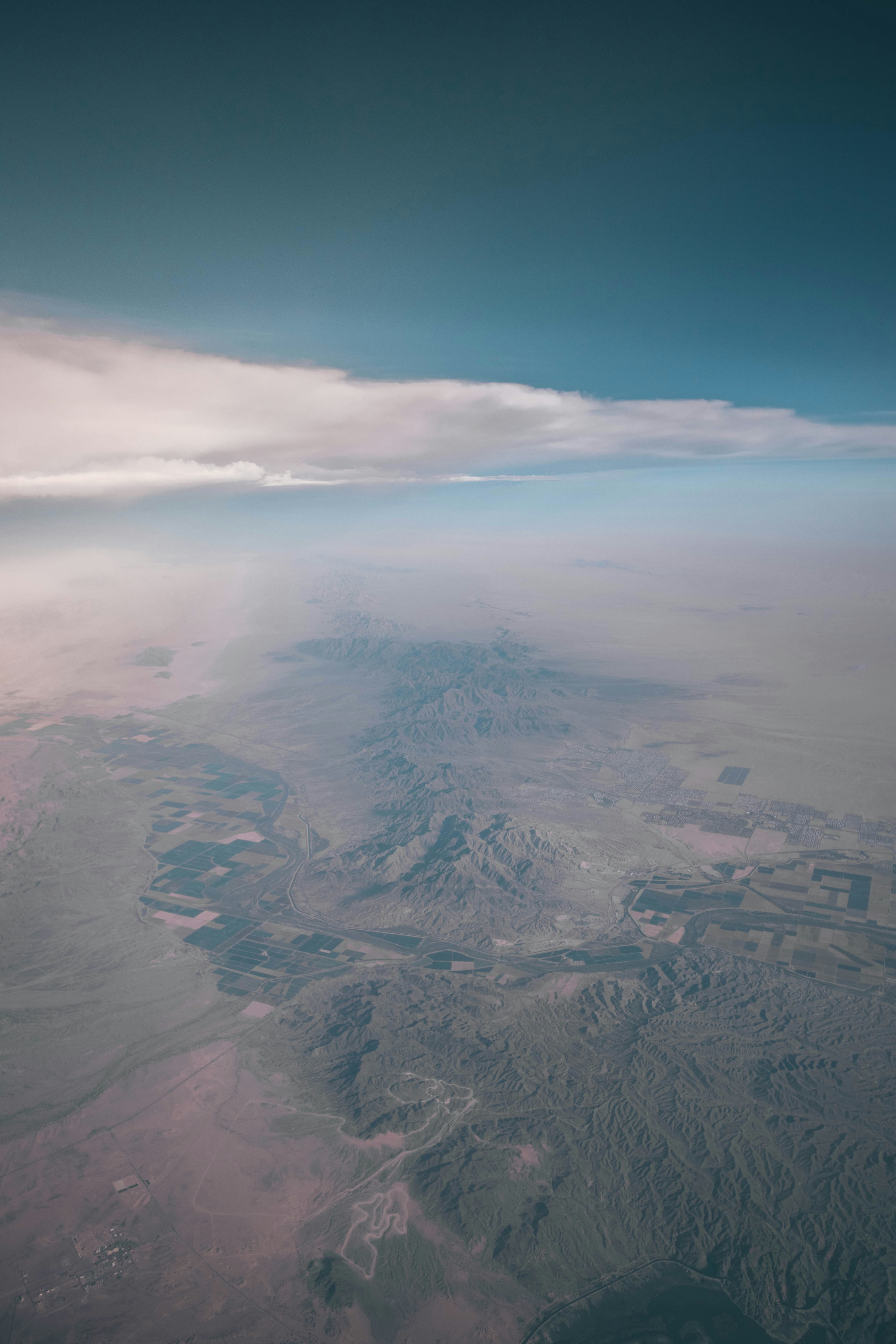 Ridgework Over the Desert Patchwork: An Aerial Valley Portrait