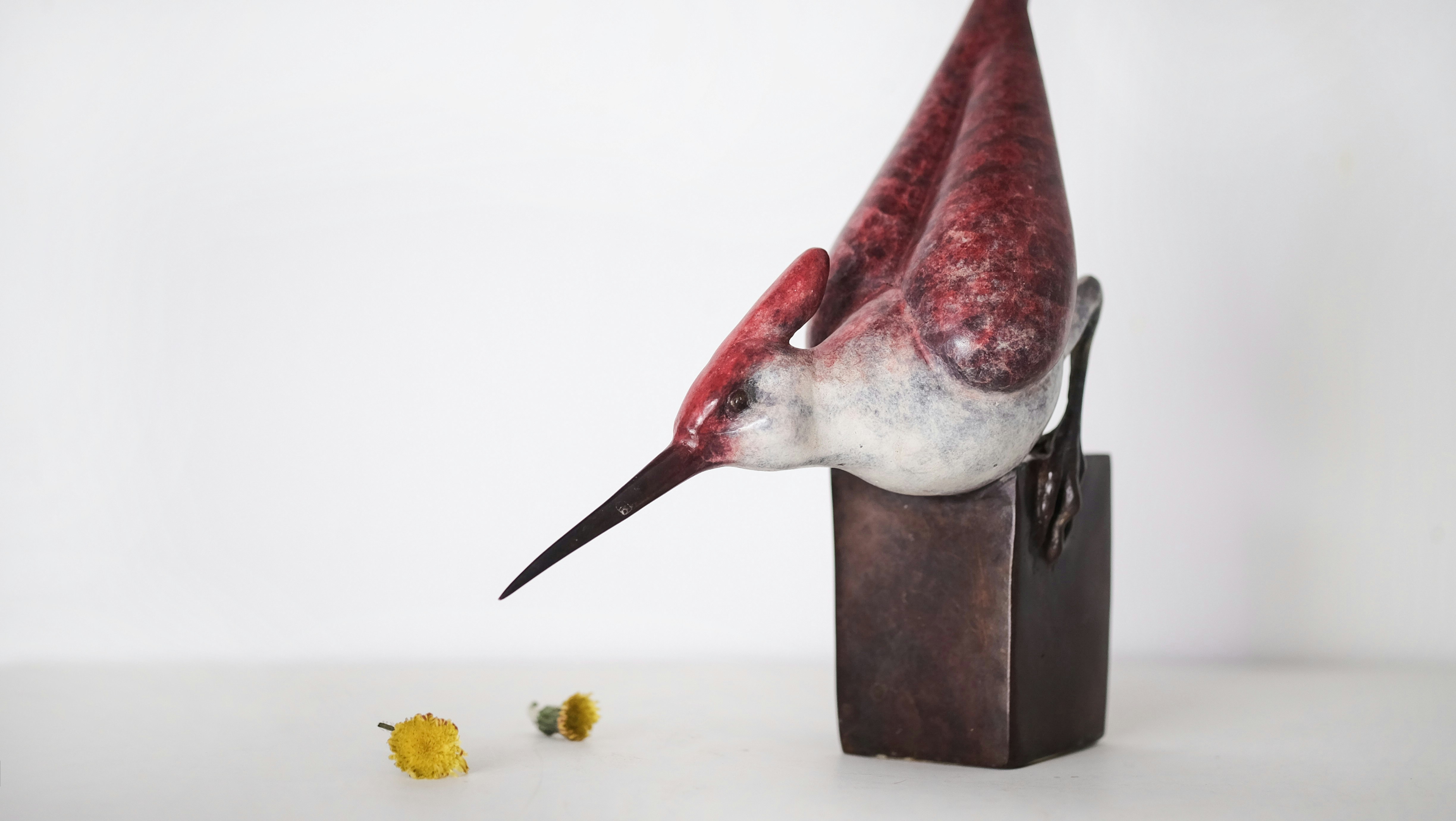 Beak and Bloom: a Minimal Still-Life with a Bird Sculpture