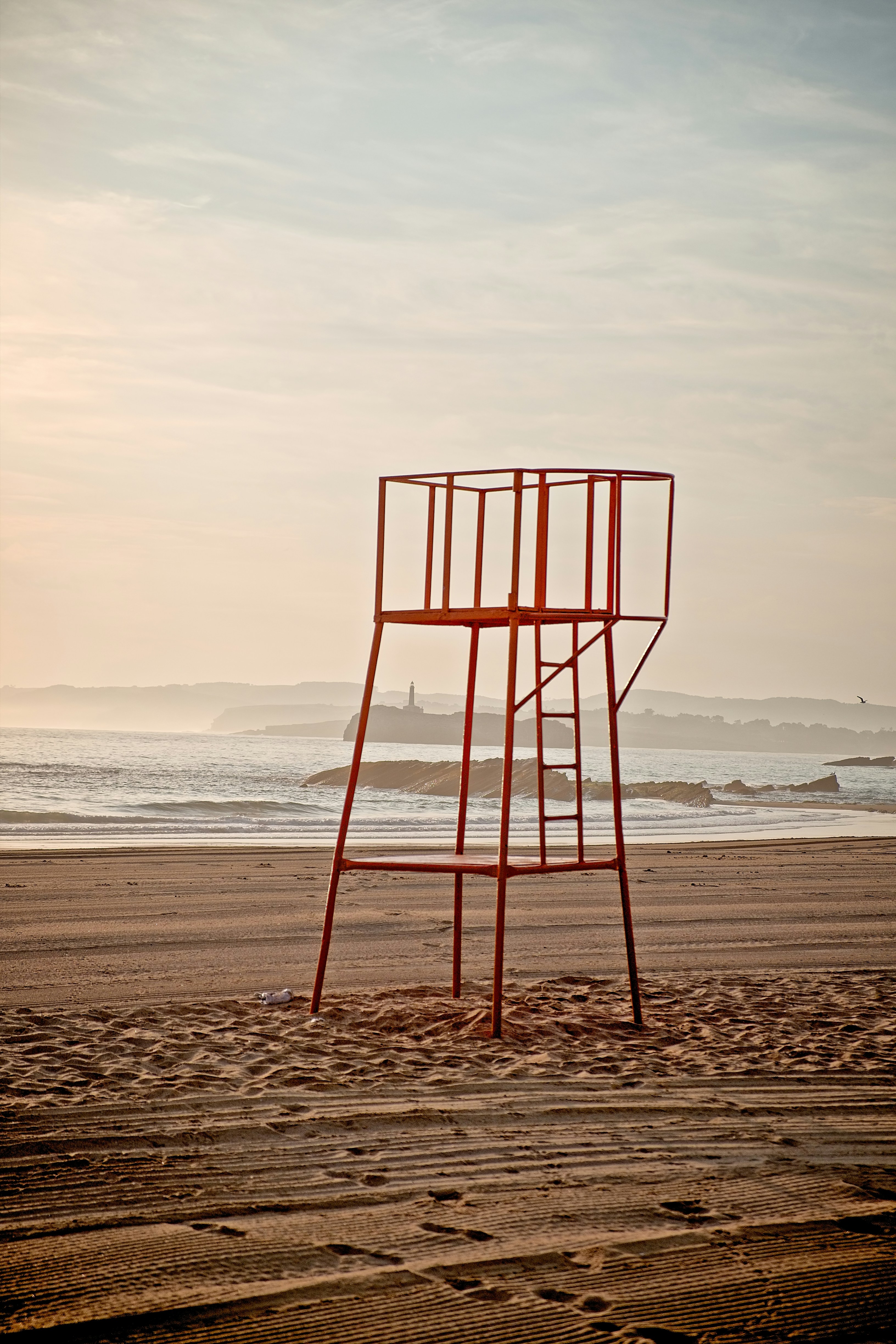 Red metal lifeguard platform photo – Free Chair Image on Unsplash