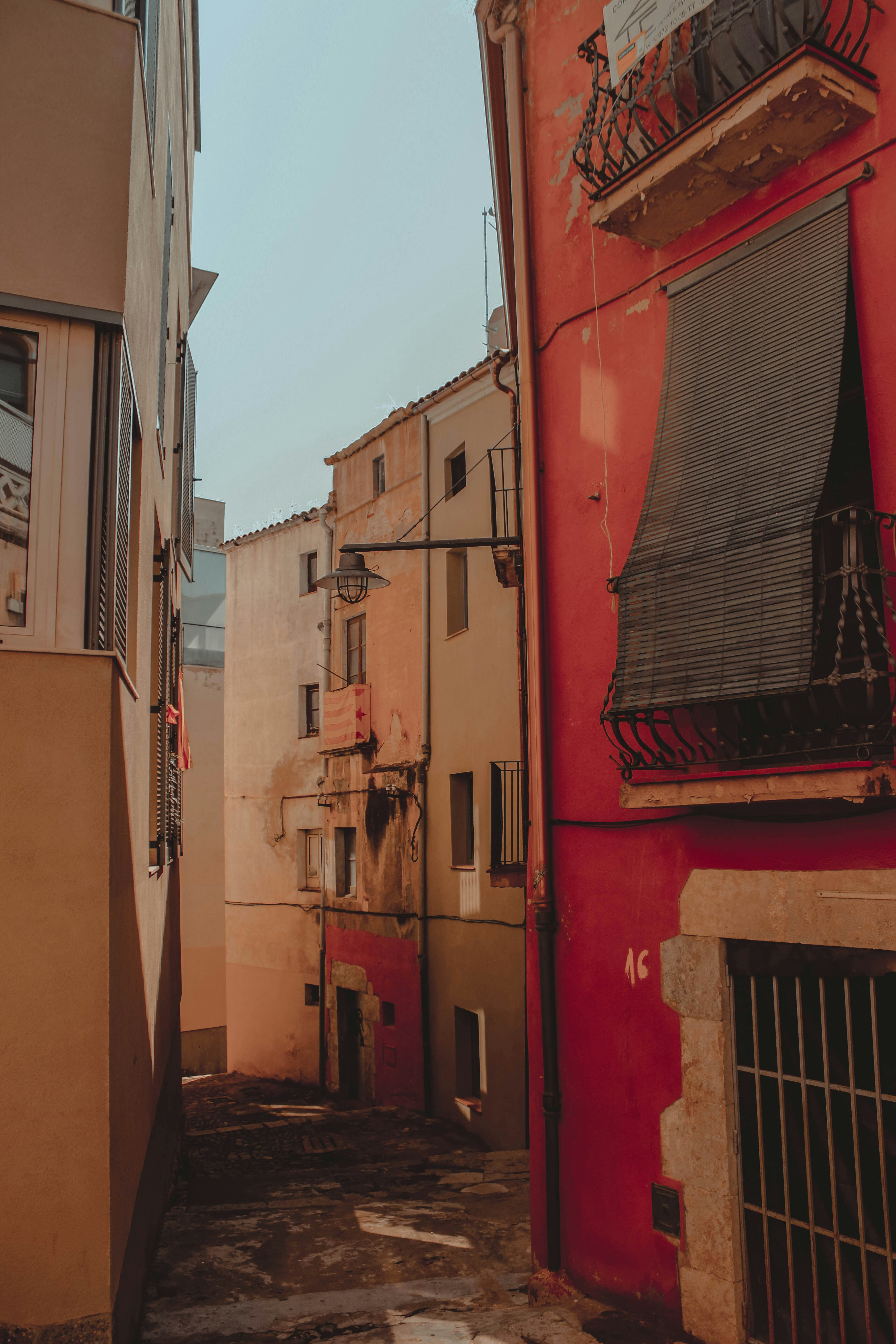 Aisle between high-rise buildings at daytime photo – Free Spain Image ...