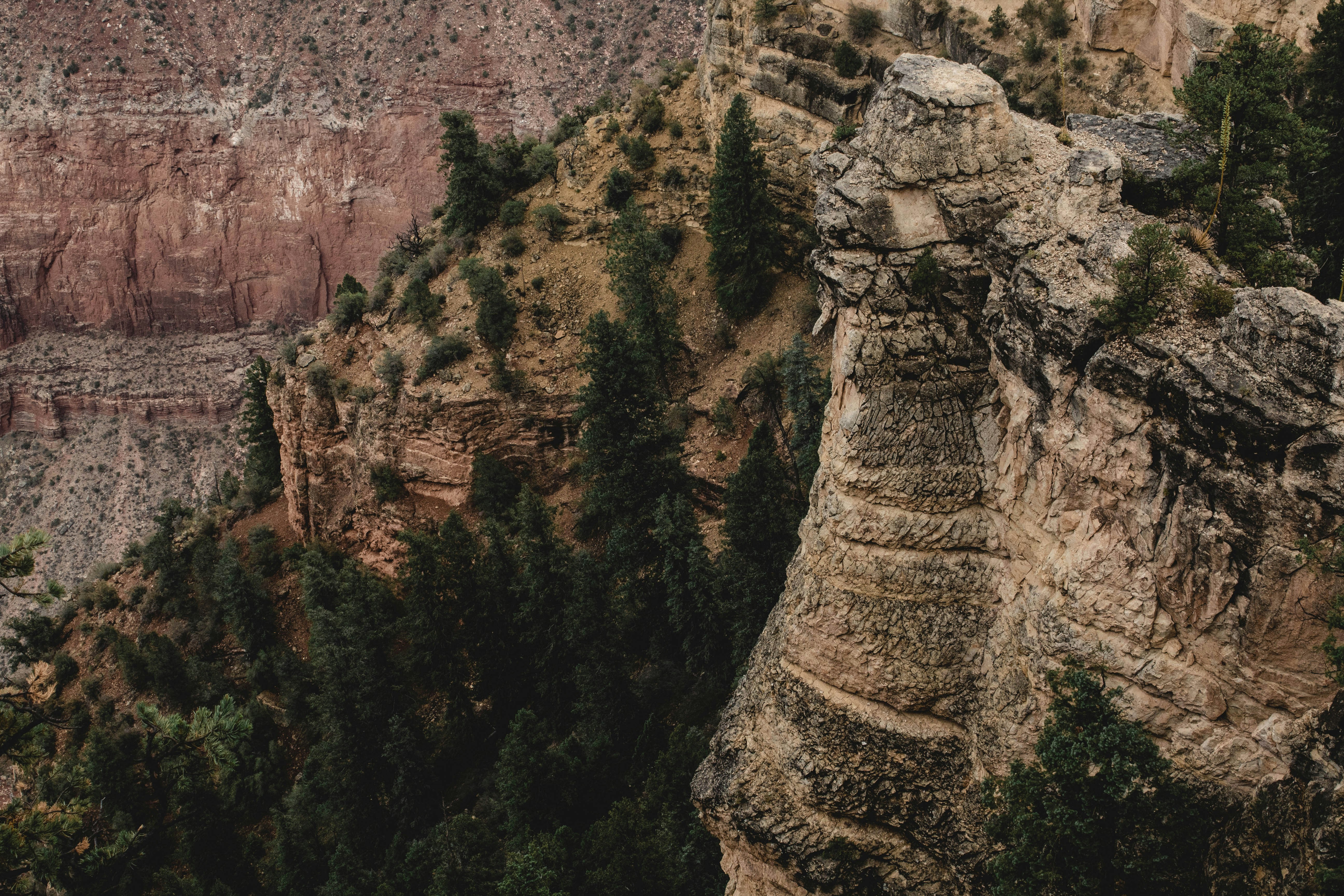 Carved Sentinel: A towering canyon spire amid rugged cliffs