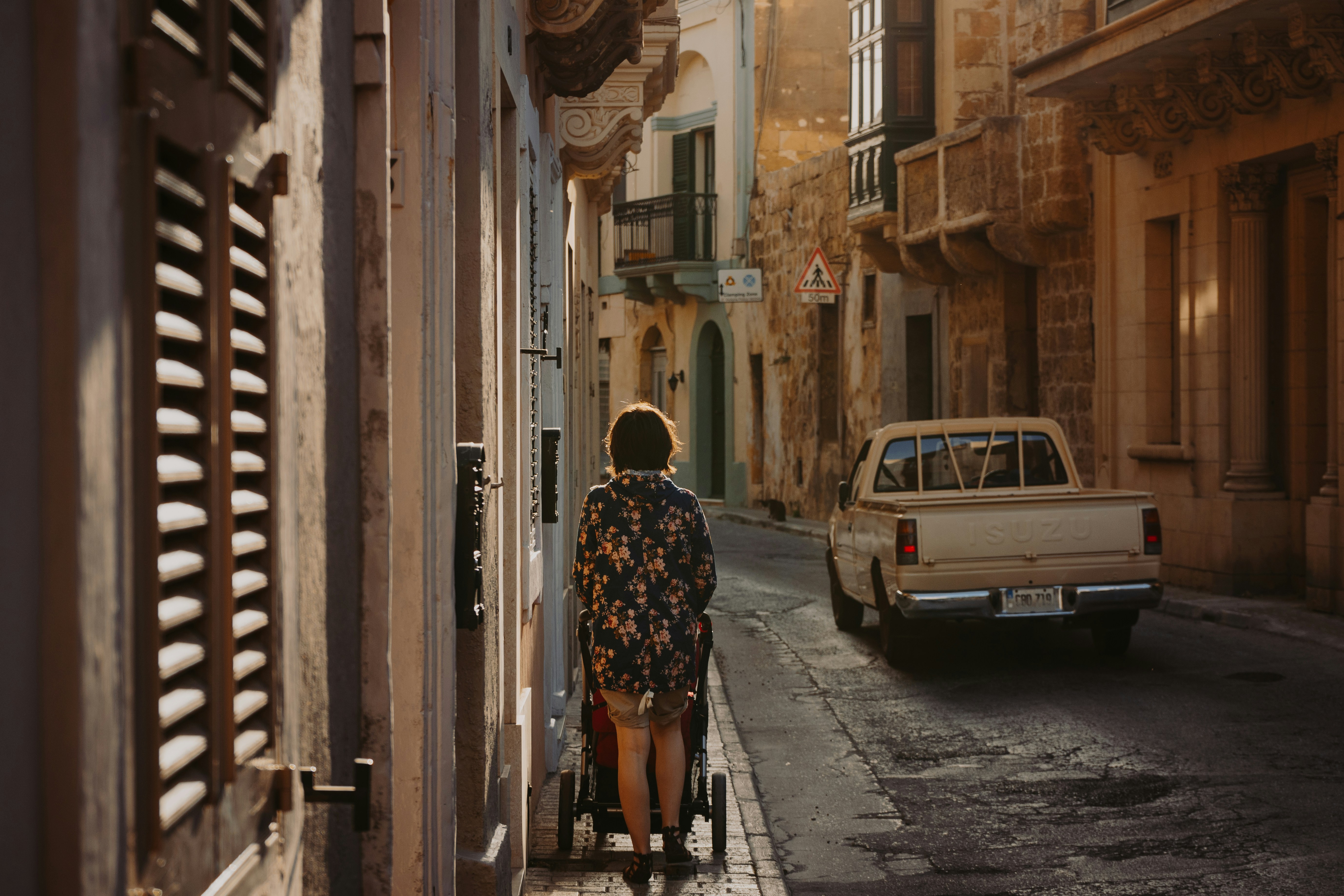 For me, the stories that last forever are usually trips to new places. And the photos I take during those trips are a great key back which helps you to revisit those emotions again and again. | woman in blue and white floral top