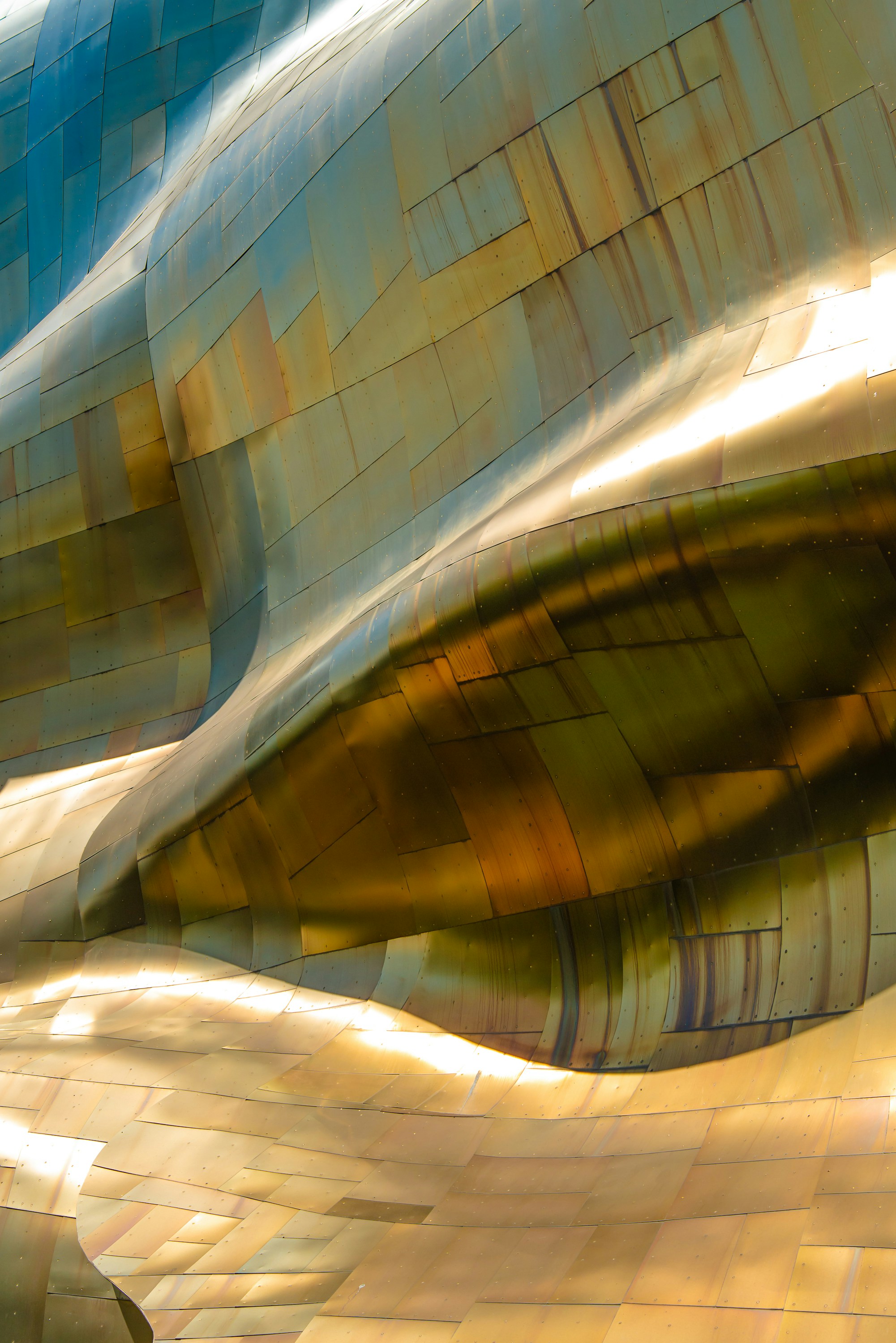 A close up of a building with a curved roof photo – Free Arhchitecture ...
