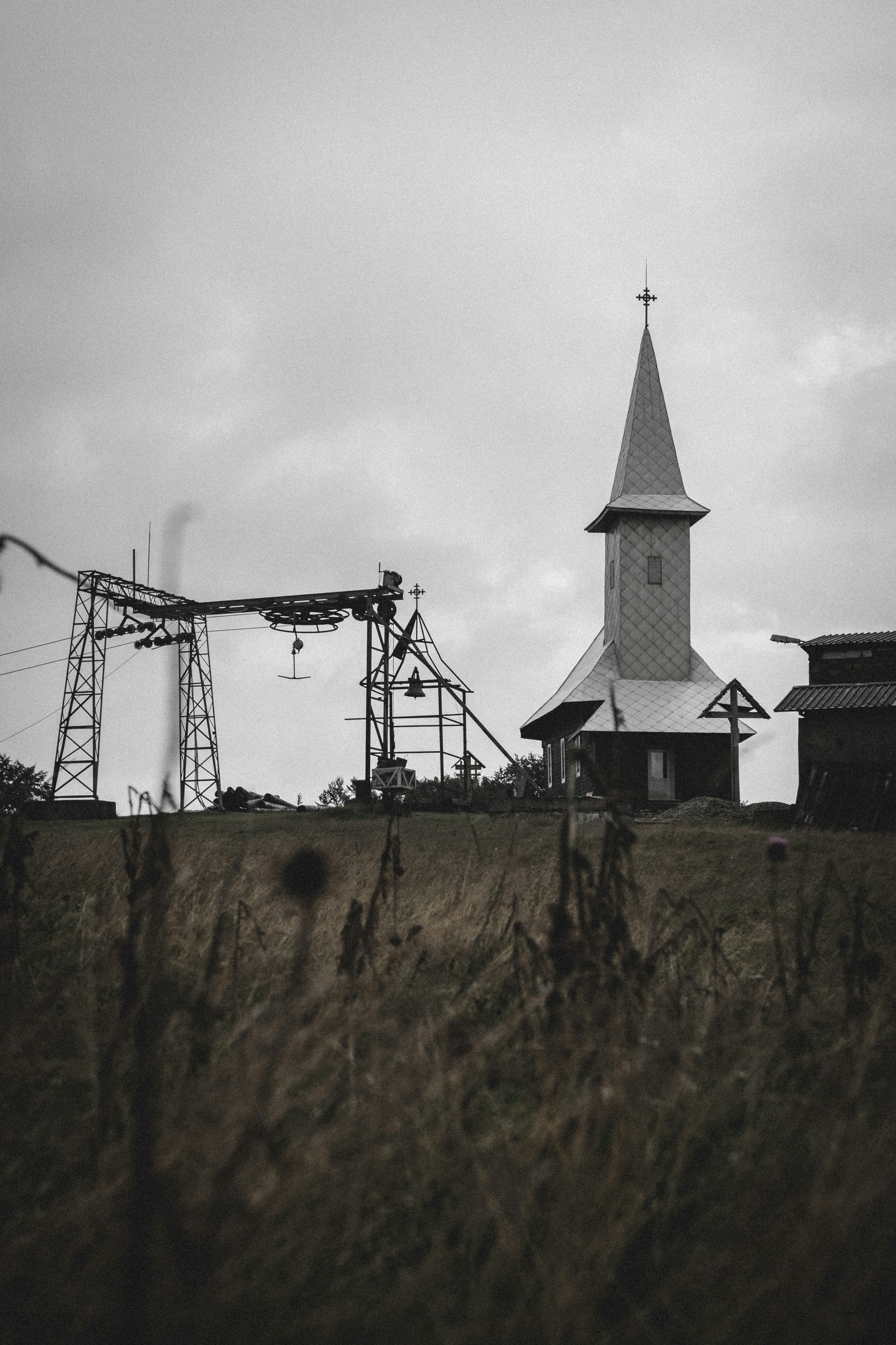 Gray chapel on grass field photo – Free Wallpaper Image on Unsplash