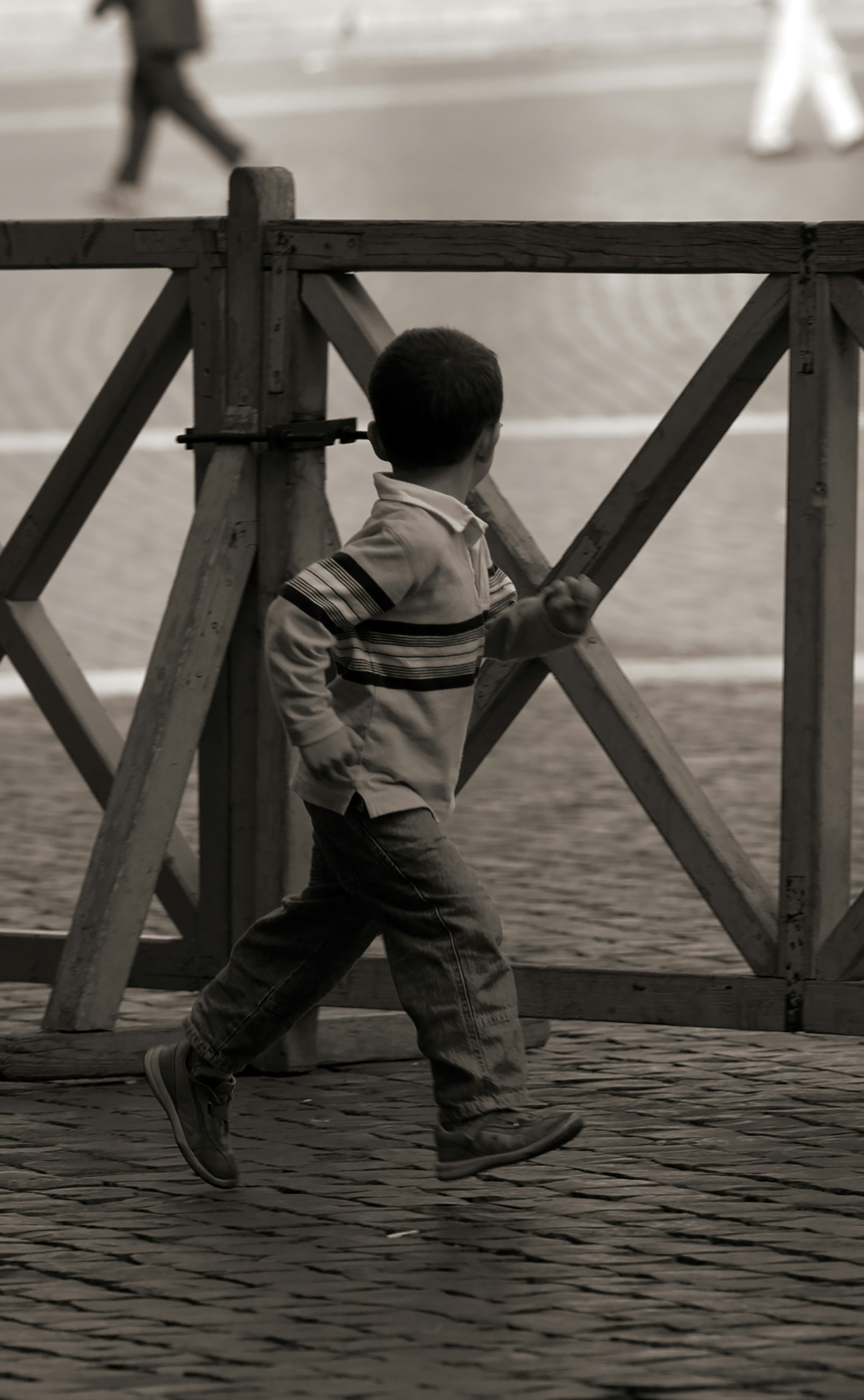 Boy running beside fence photo – Free Vatican city Image on Unsplash