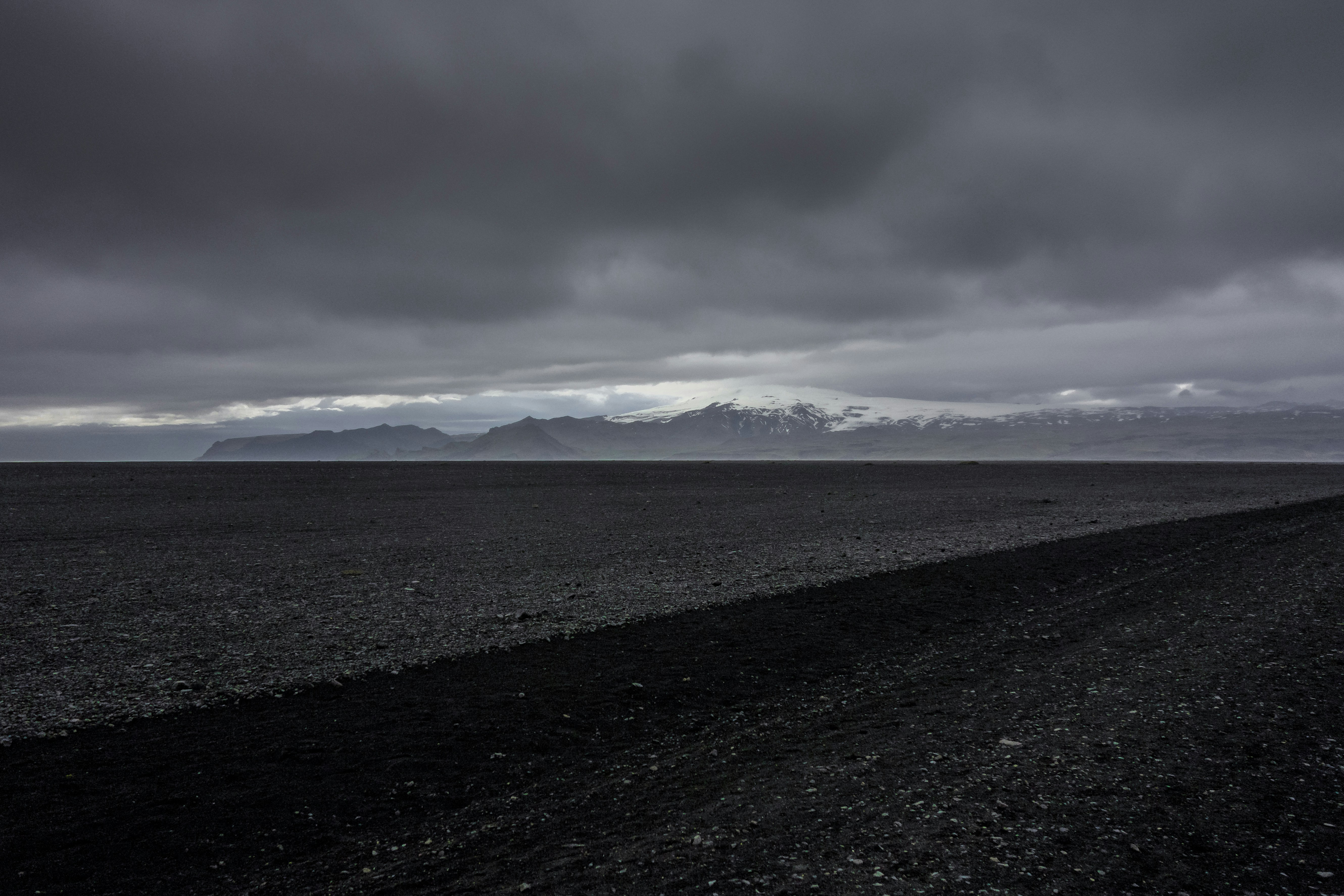 Solheimasandur solitude II | grayscale photo of road