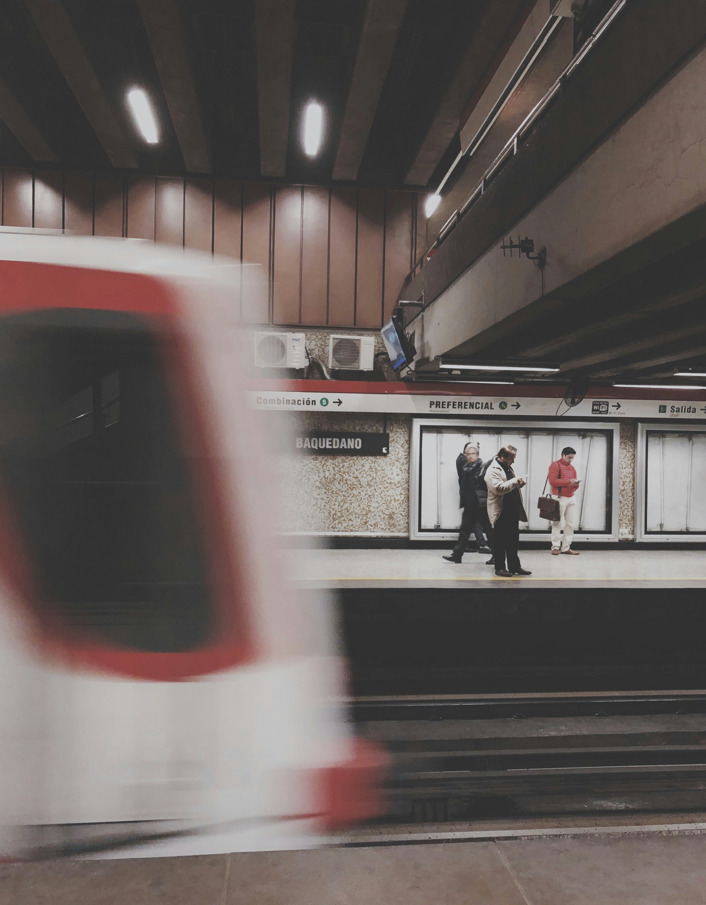Four person standing inside the train station photo – Free Av ...