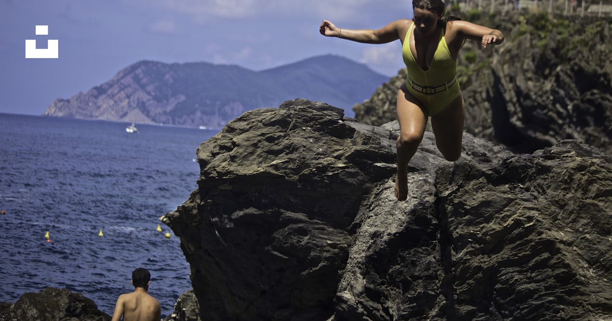 Time Lapse Photography Of Woman Wearing One Piece Swimsuit Jumping From