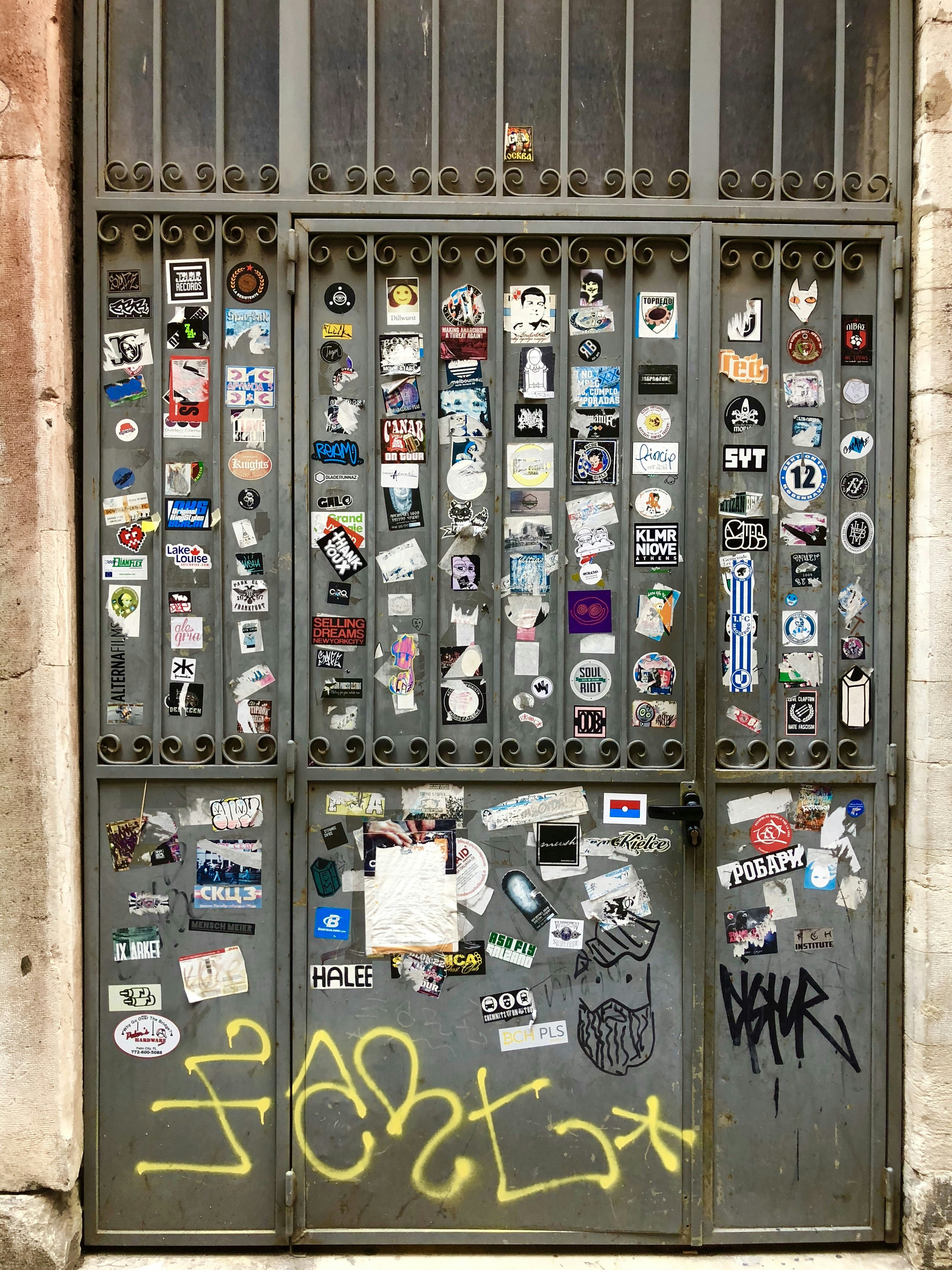 Stickered Gate: A Patchwork Portal to the City