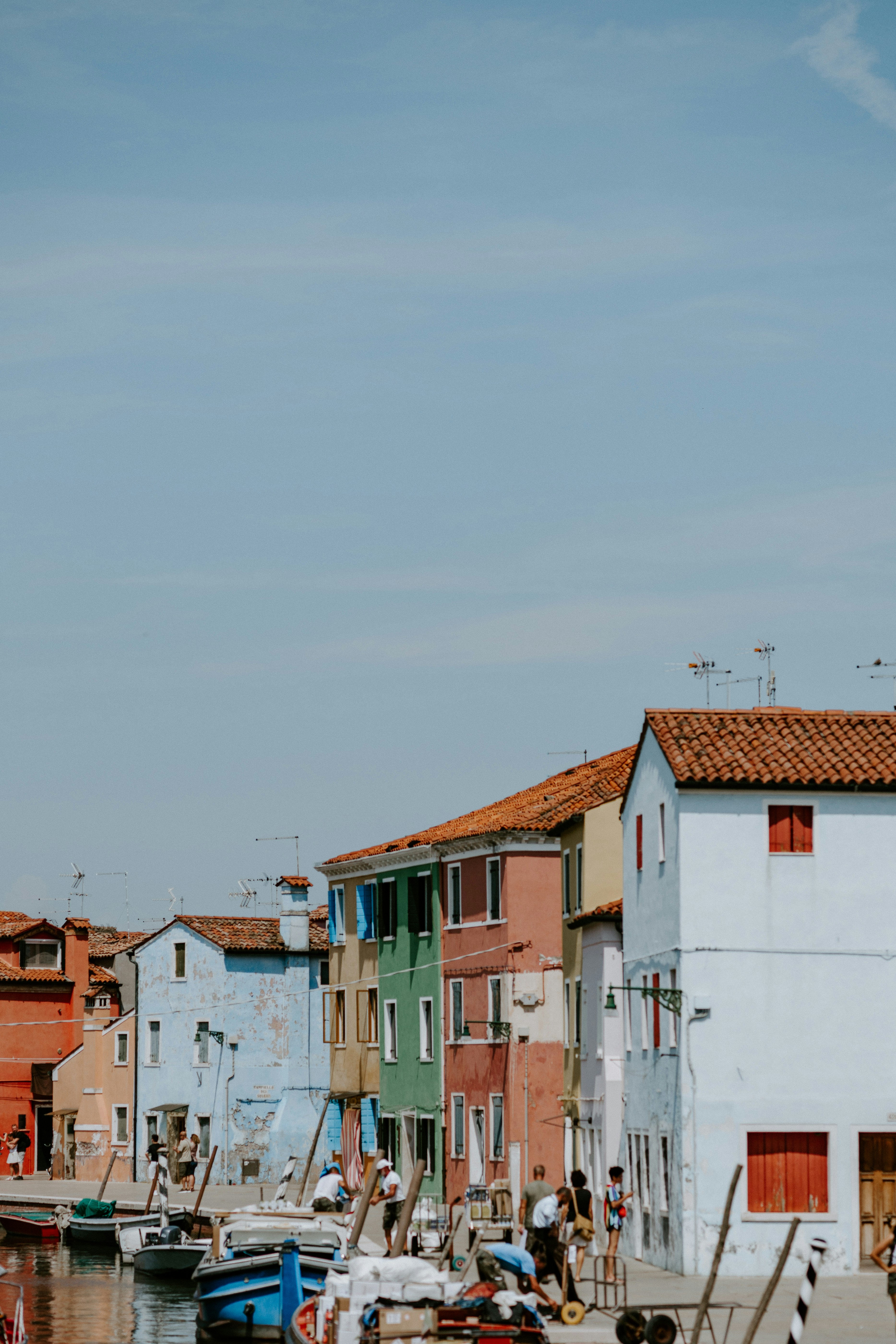 3-storey blue concrete building photo – Free Burano Image on Unsplash