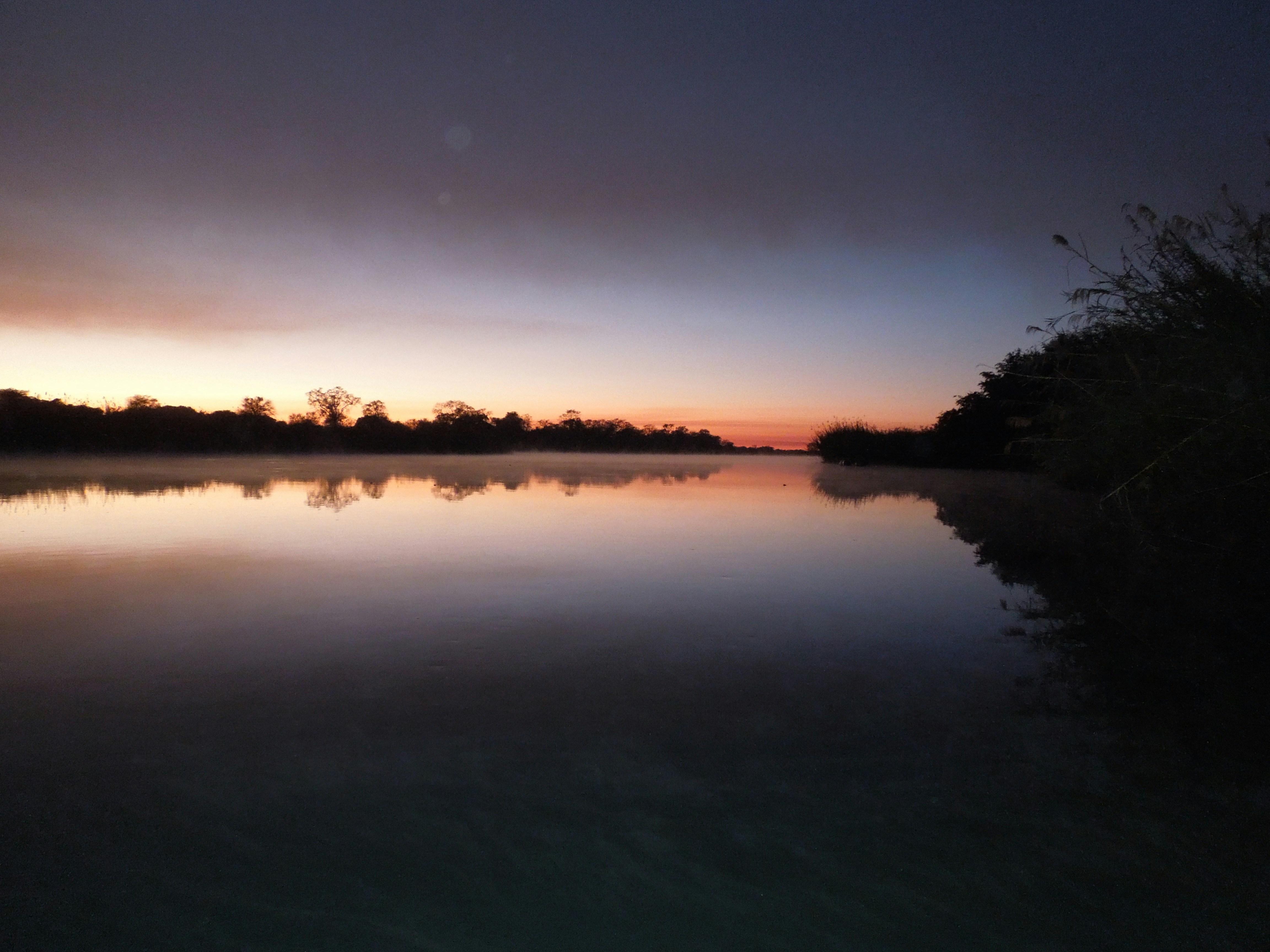 Body of water with silhouette of trees photo – Free Zimbabwe Image on ...