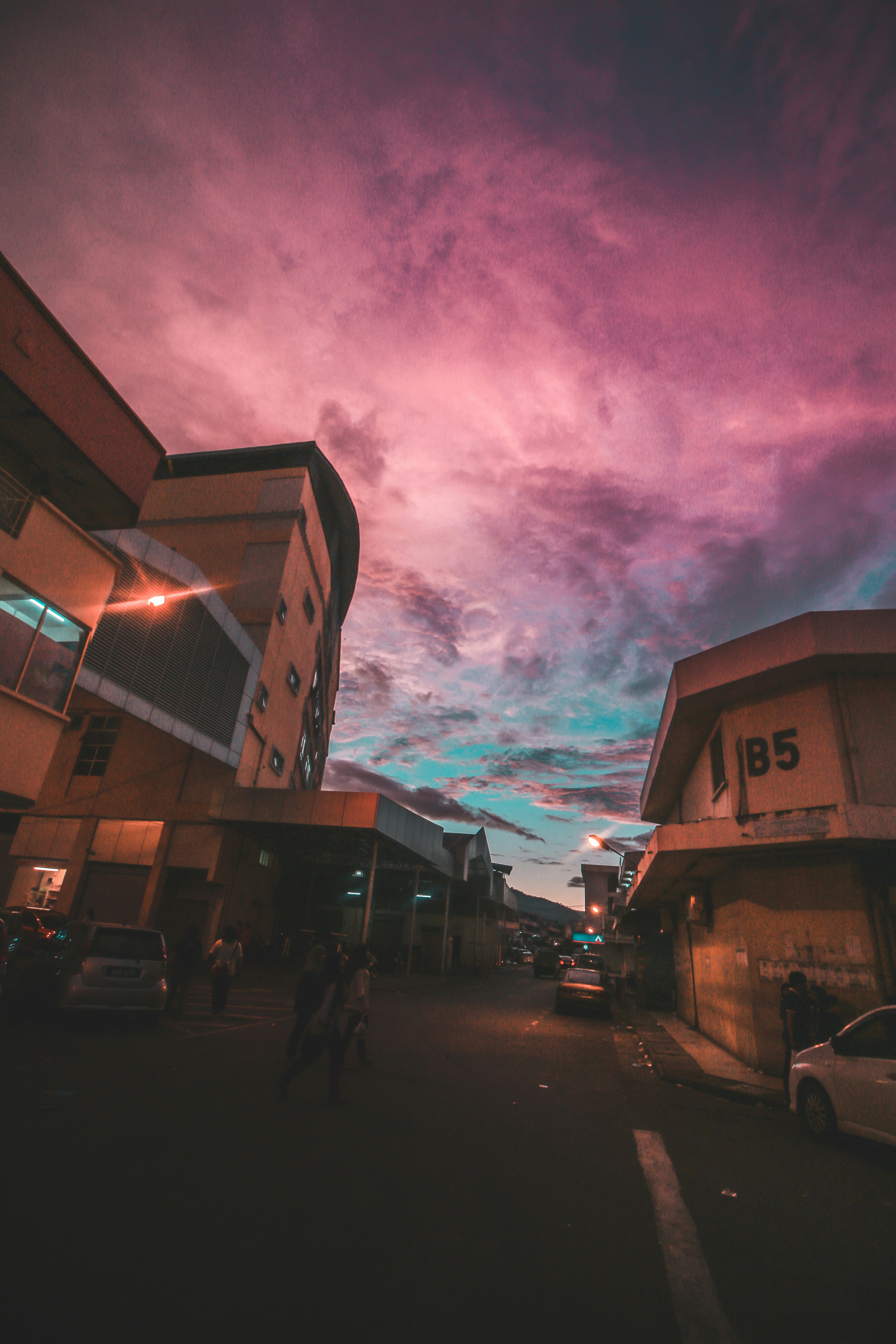 Crimson Hour Over a Quiet Urban Corridor
