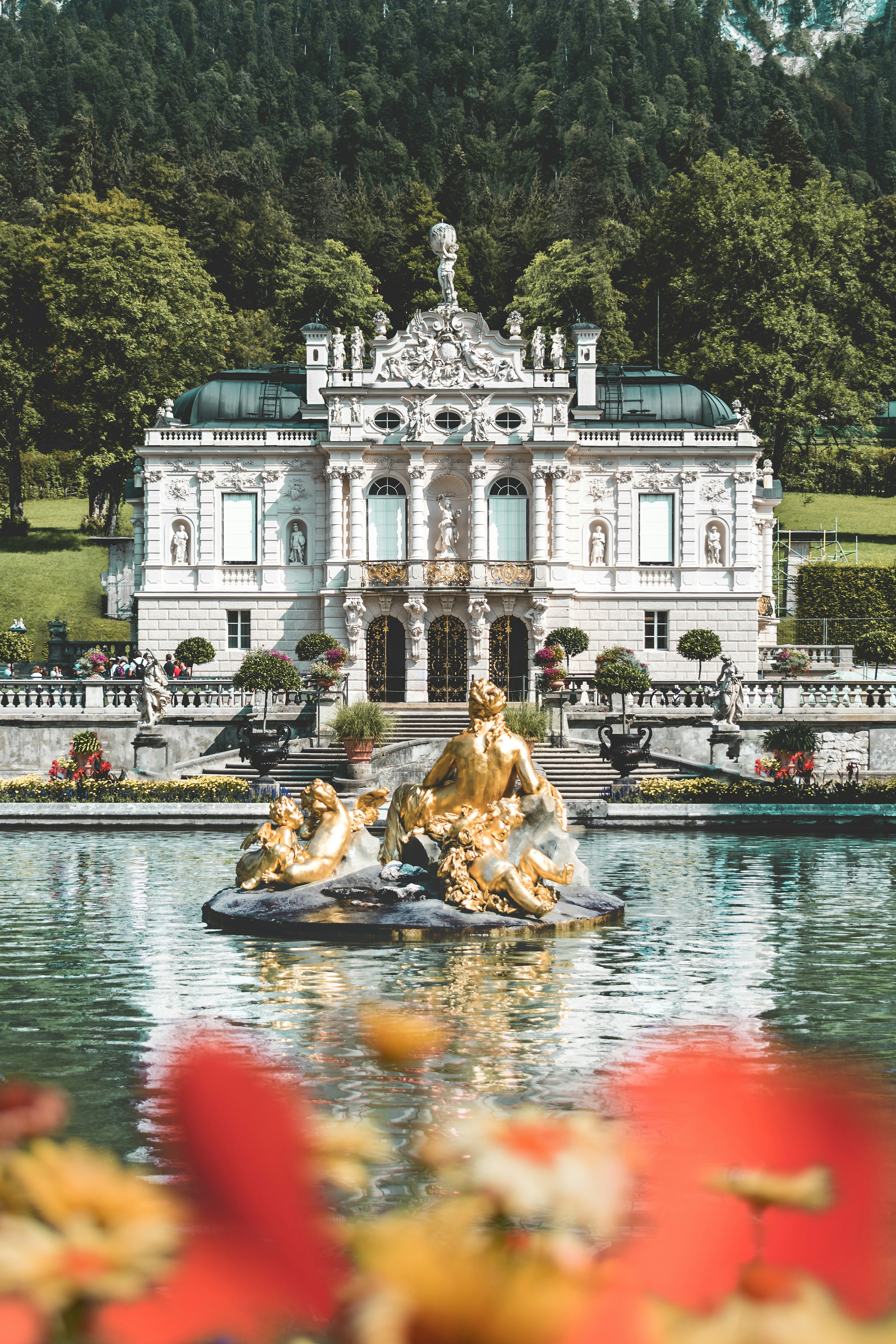 Gilded Fountain Centerpiece Before a Baroque Palace