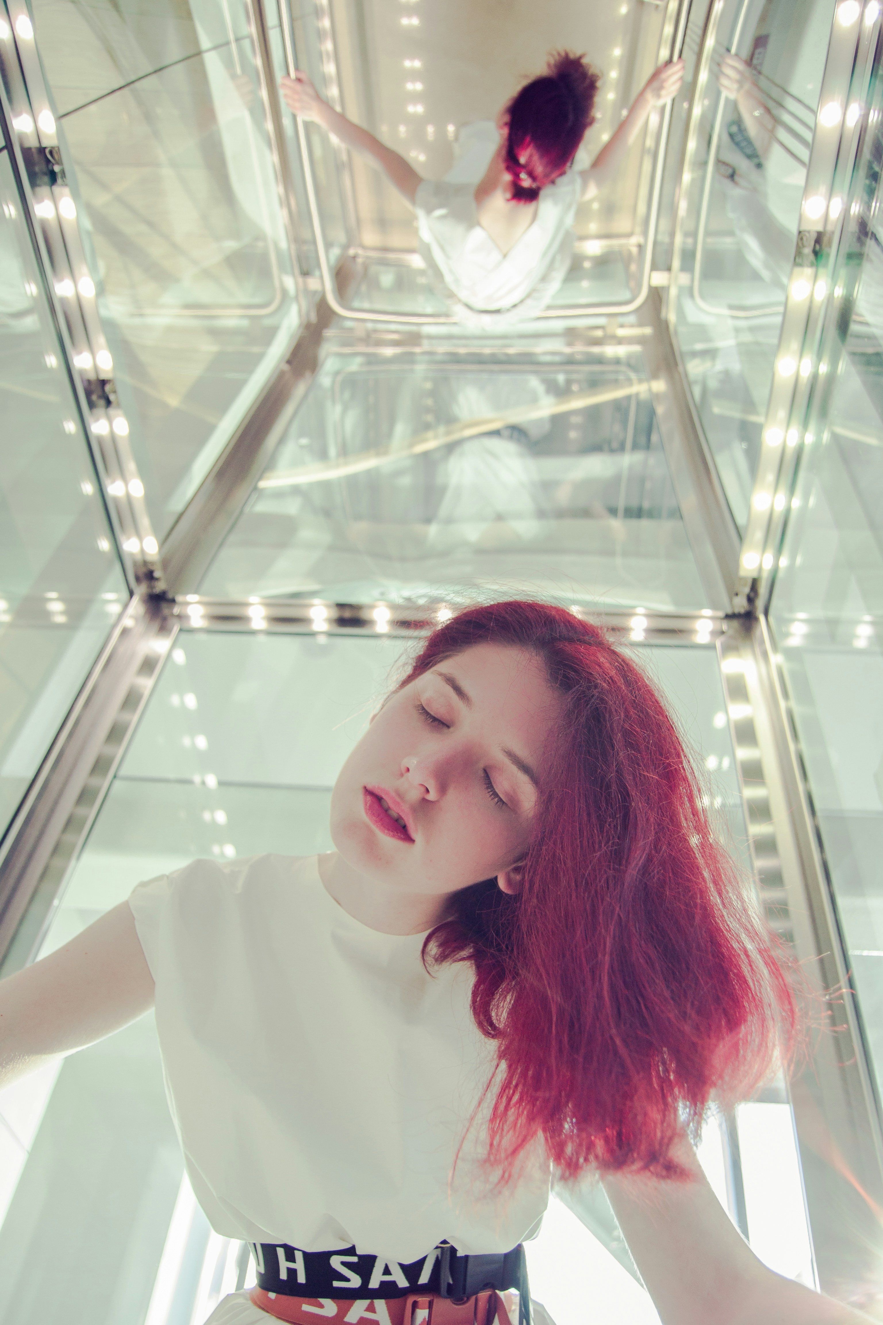 Vertigo in Glass: Portrait of a Red-Haired Moment