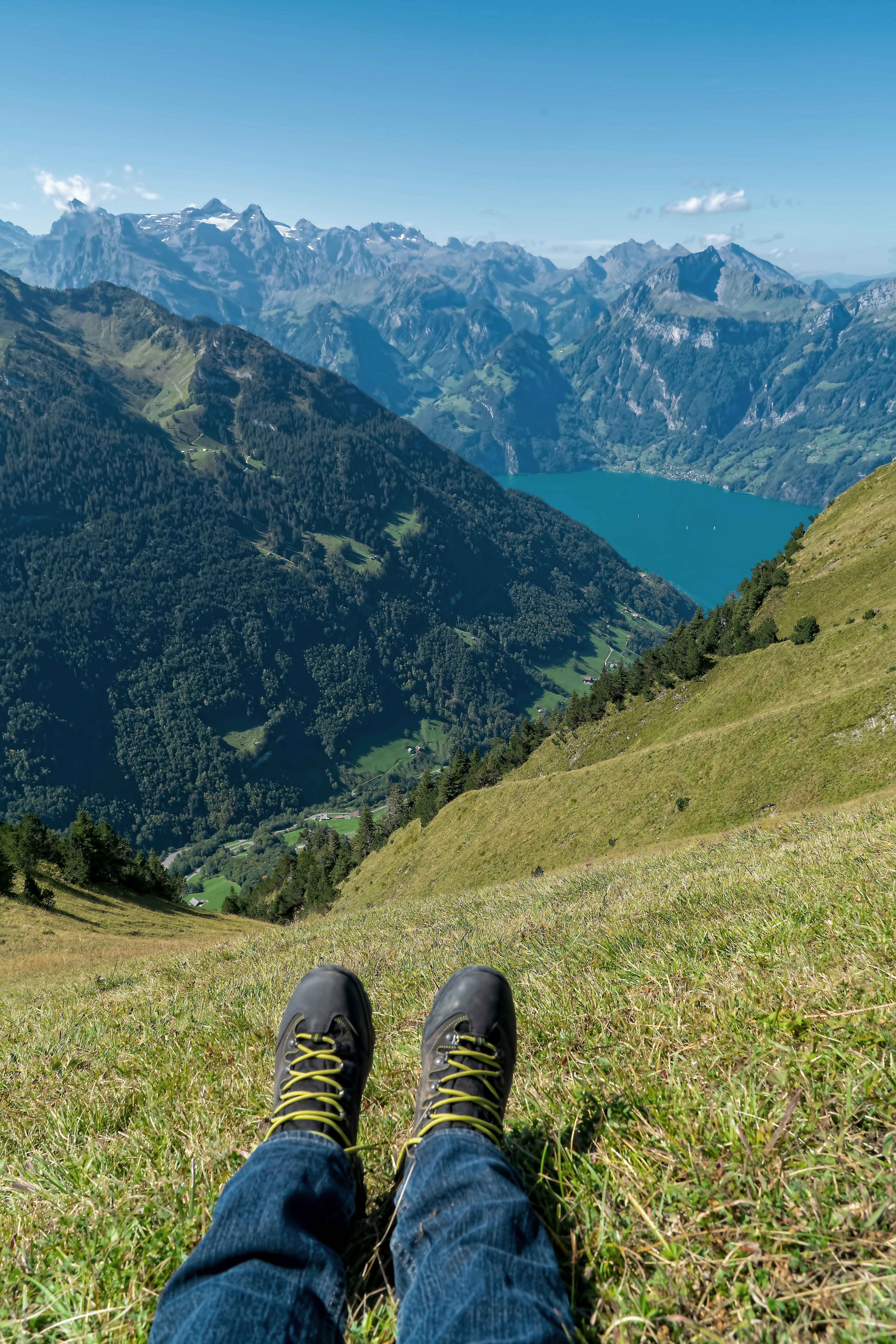 Seated on the Slope: A Mountain View Noted by Boots and Hills